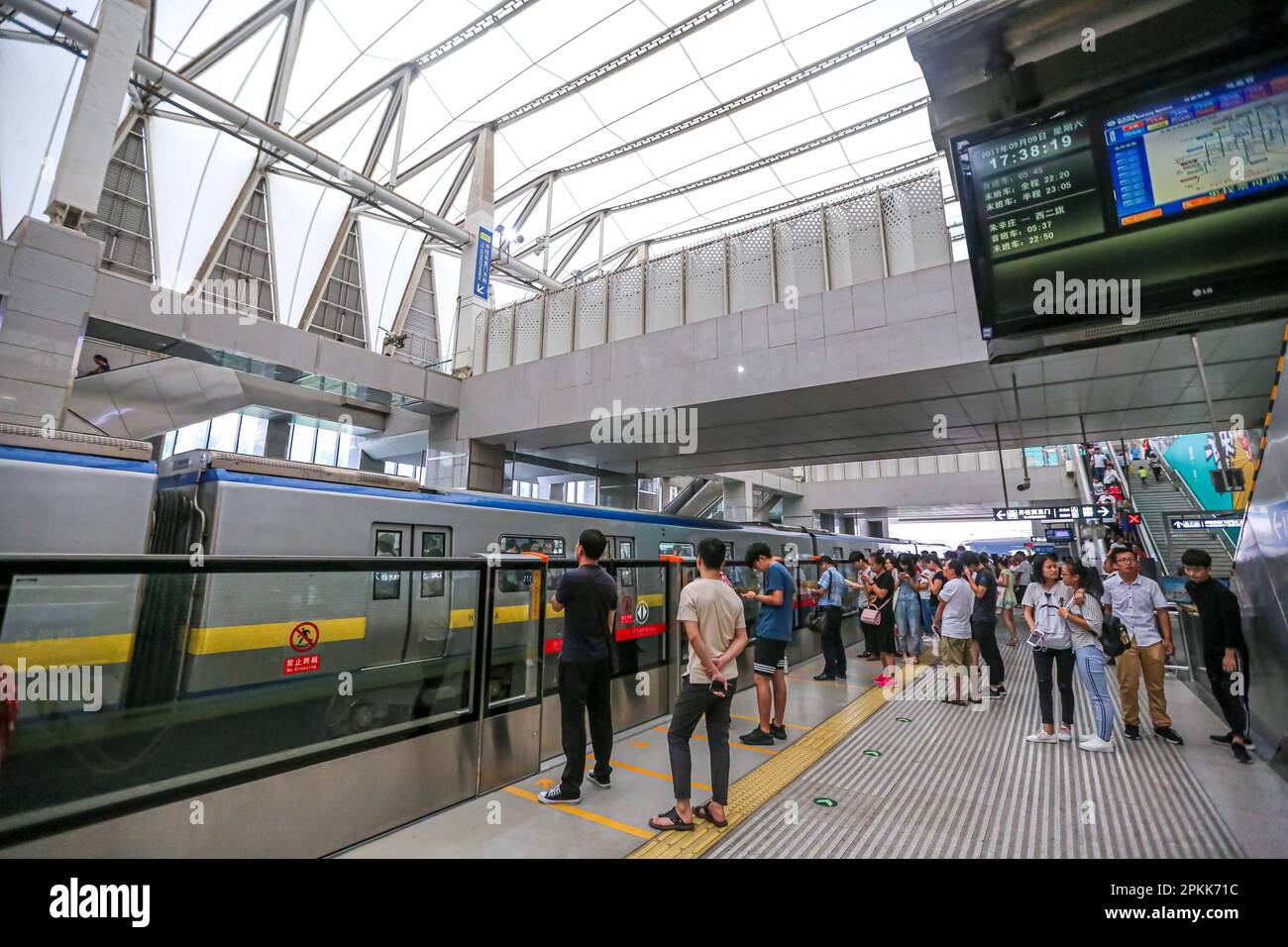Subway station platform and passengers in Beijing, China Stock Photo ...