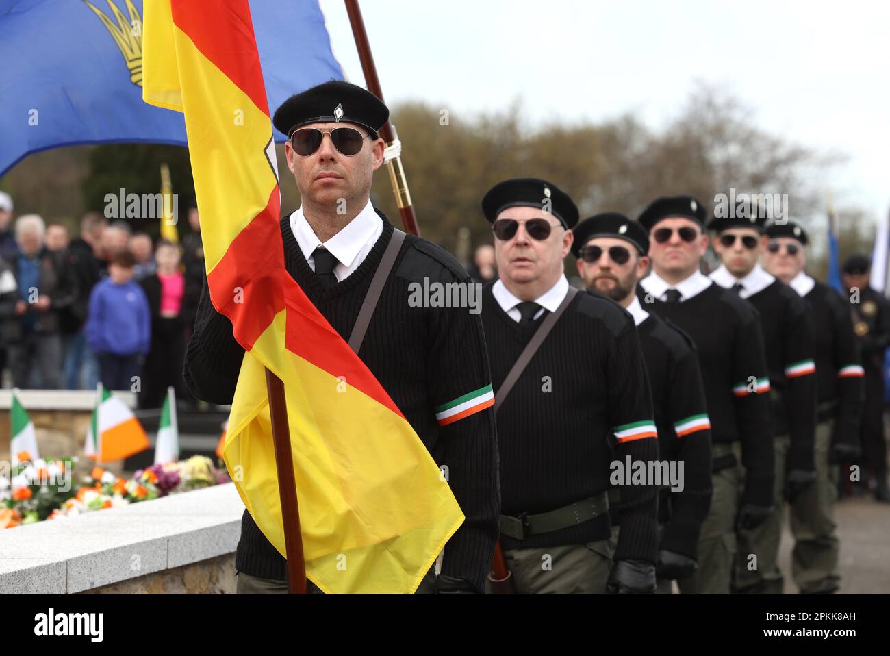 A colour party at Milltown Cemetery during an Easter commemoration ...