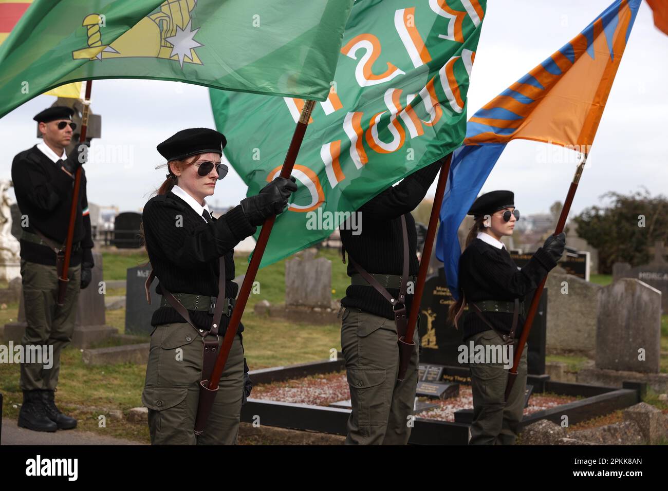 A colour party at Milltown Cemetery during an Easter commemoration ...
