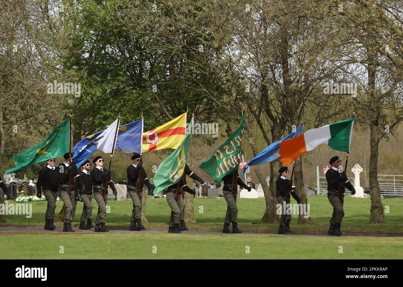 A colour party at Milltown Cemetery during an Easter commemoration ...