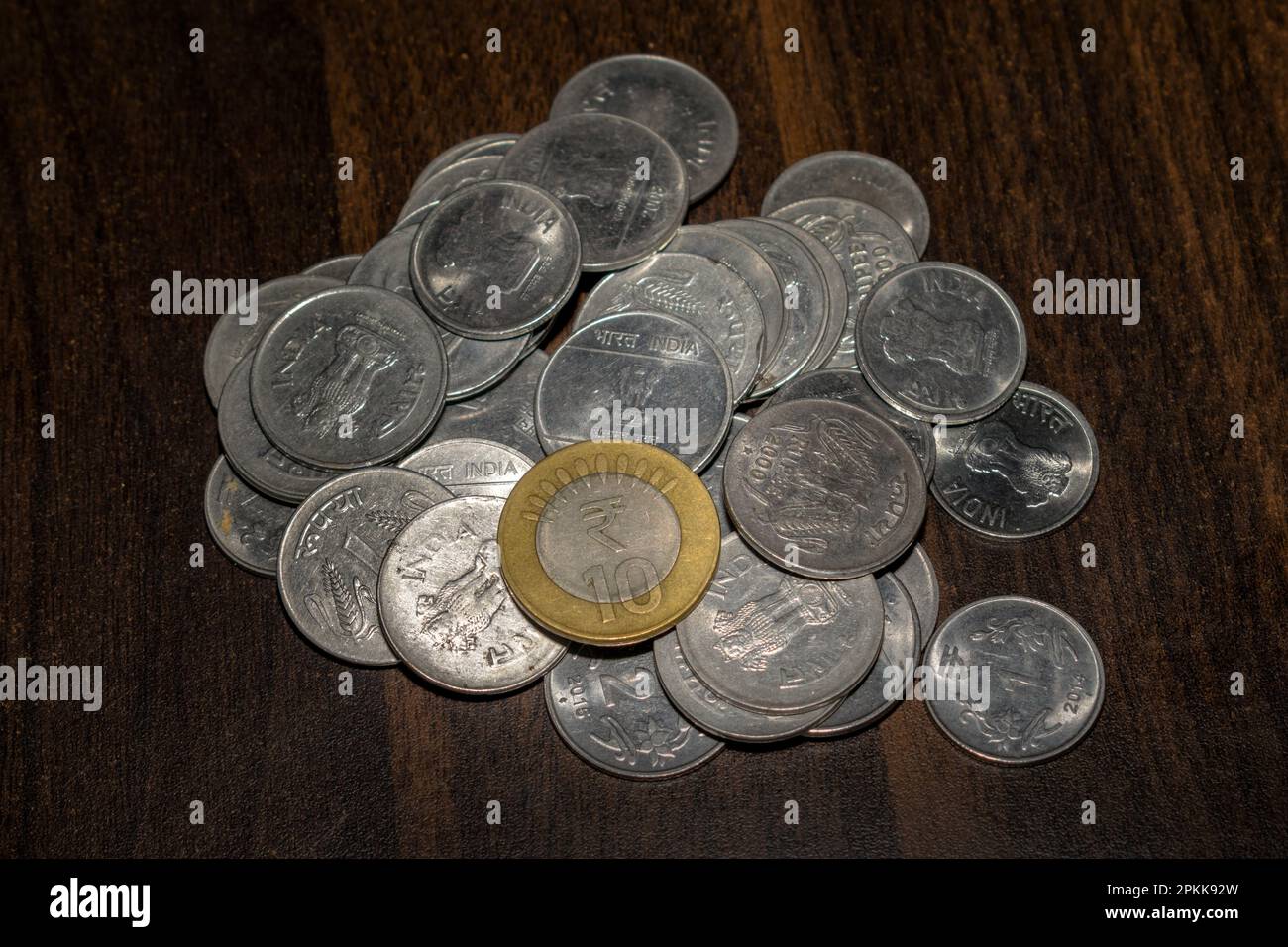 Collection of Indian rupee currency coins on a wood background Stock ...