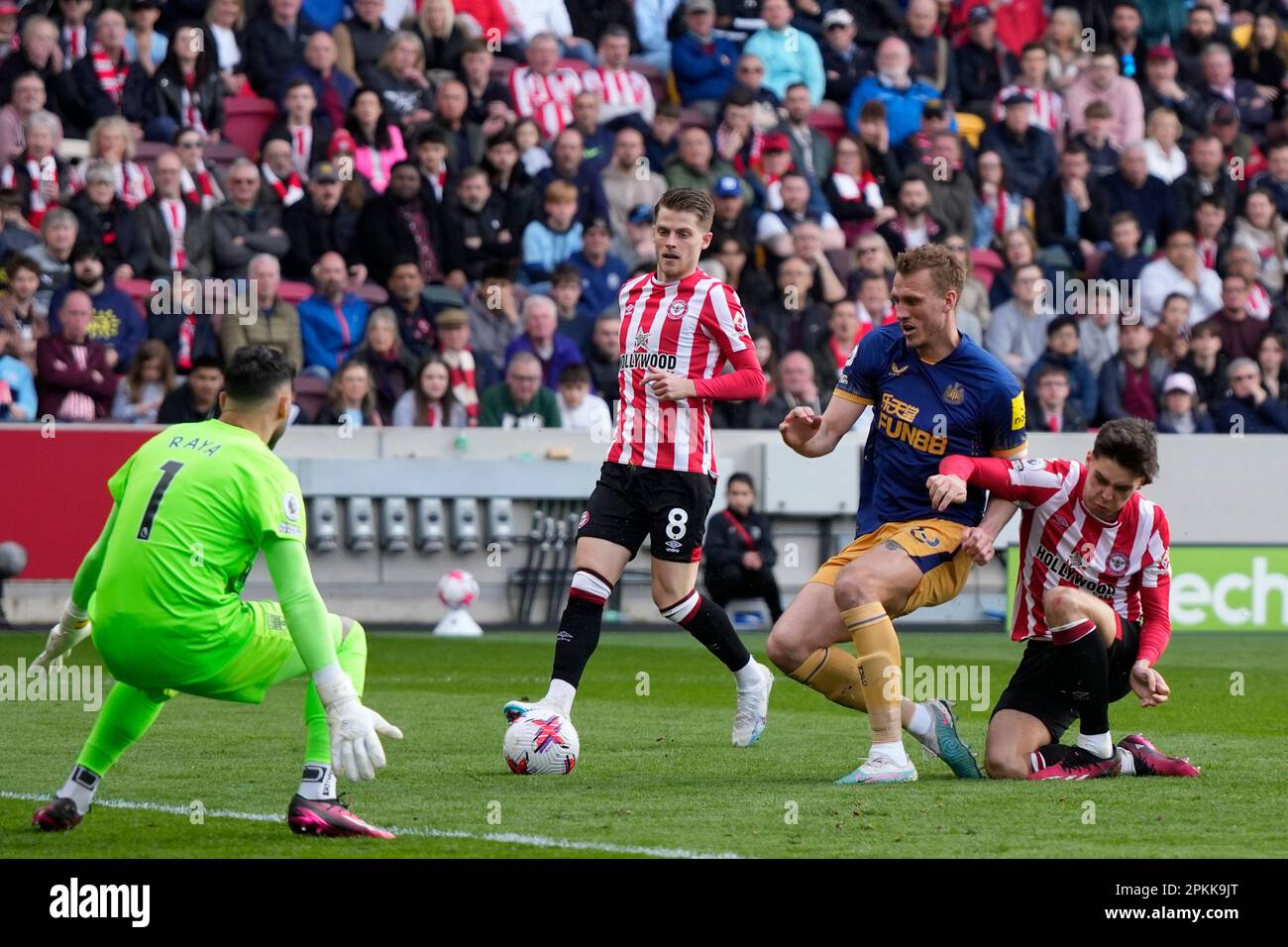 Newcastle's Dan Burn, second from right, fails to score challenged by ...