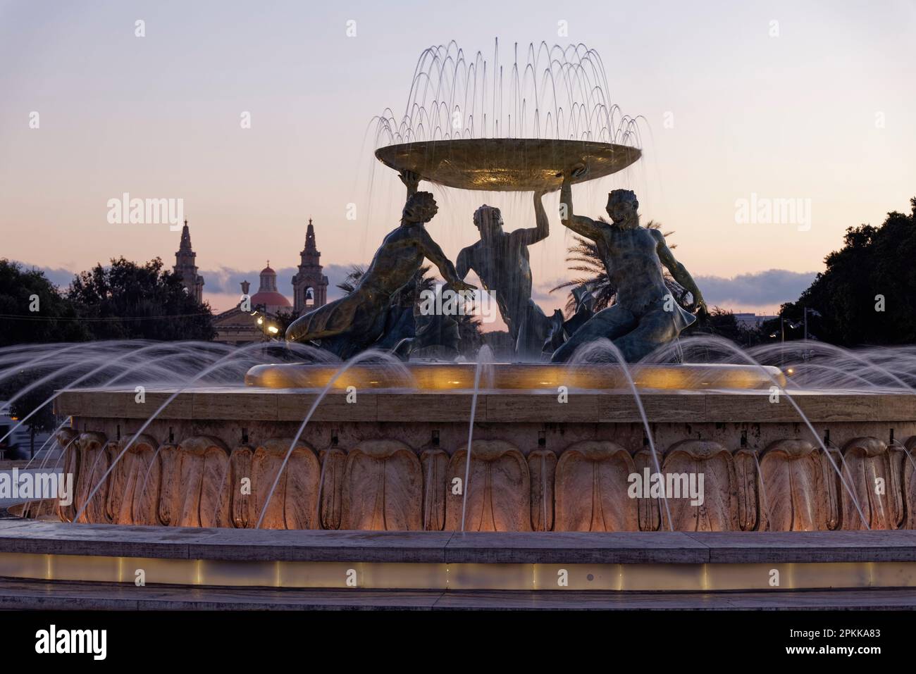 Furjana, Malta. 24th Mar, 2023. The Tritons Fountain at sunset is the ...