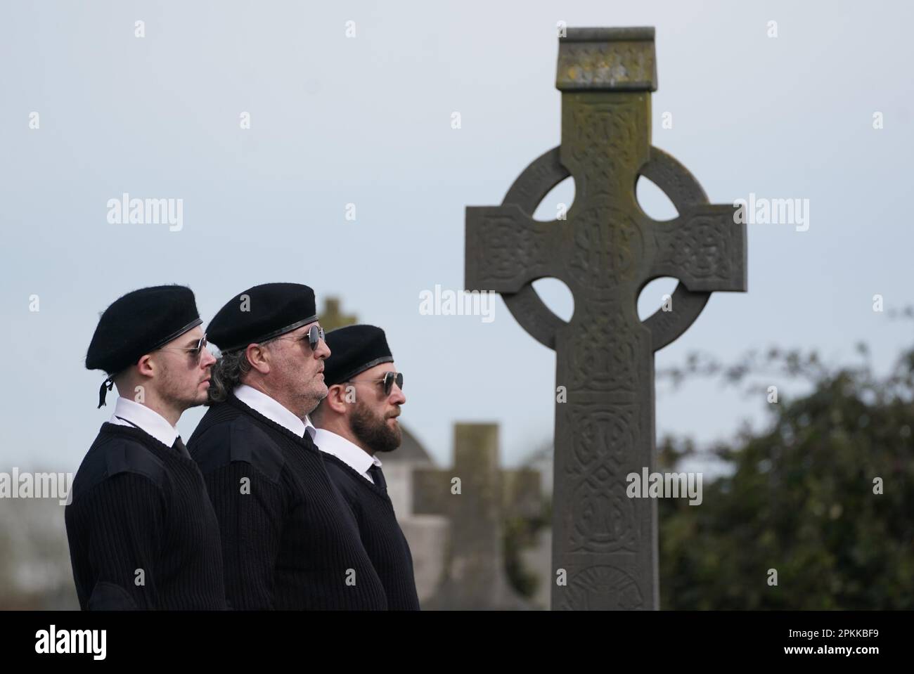 A colour party at Milltown Cemetery during an Easter commemoration ...