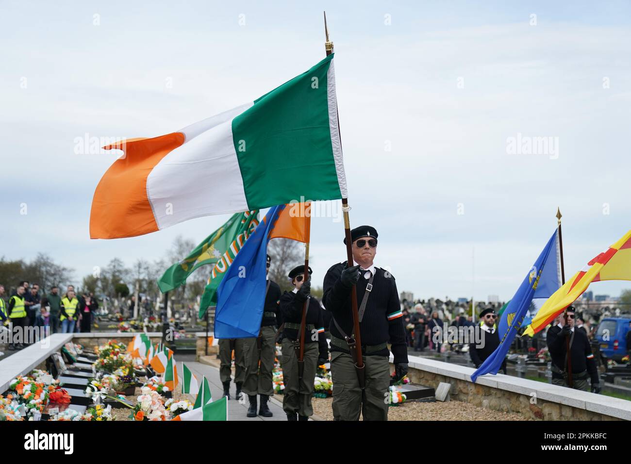 A colour party at Milltown Cemetery during an Easter commemoration ...