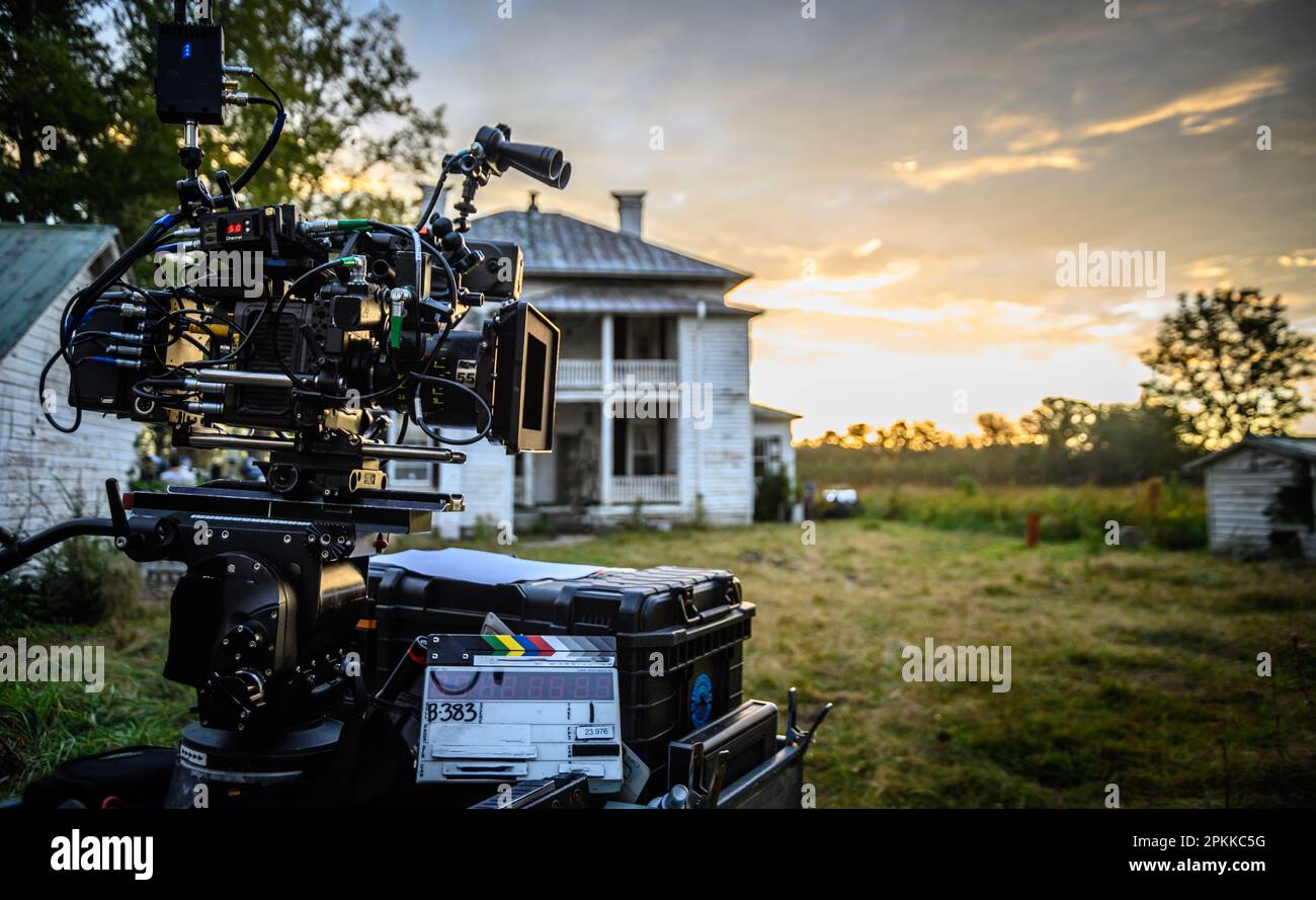 A professional cinema camera and slate at on location at sunrise Stock ...