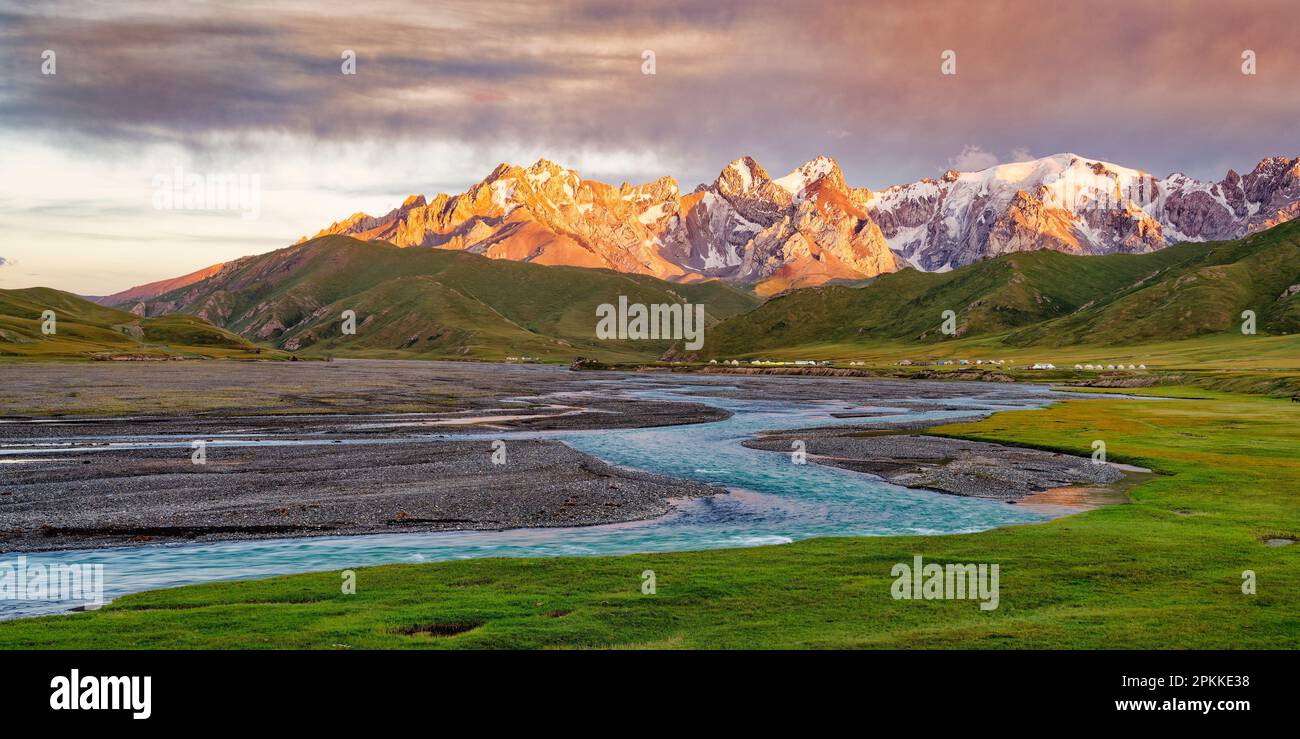 Sunset over the Central Tian Shan Mountains and glacier river, Kurumduk ...