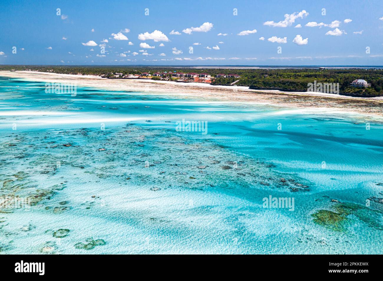 Aerial view of idyllic blue lagoon and nearby white sand beach of ...