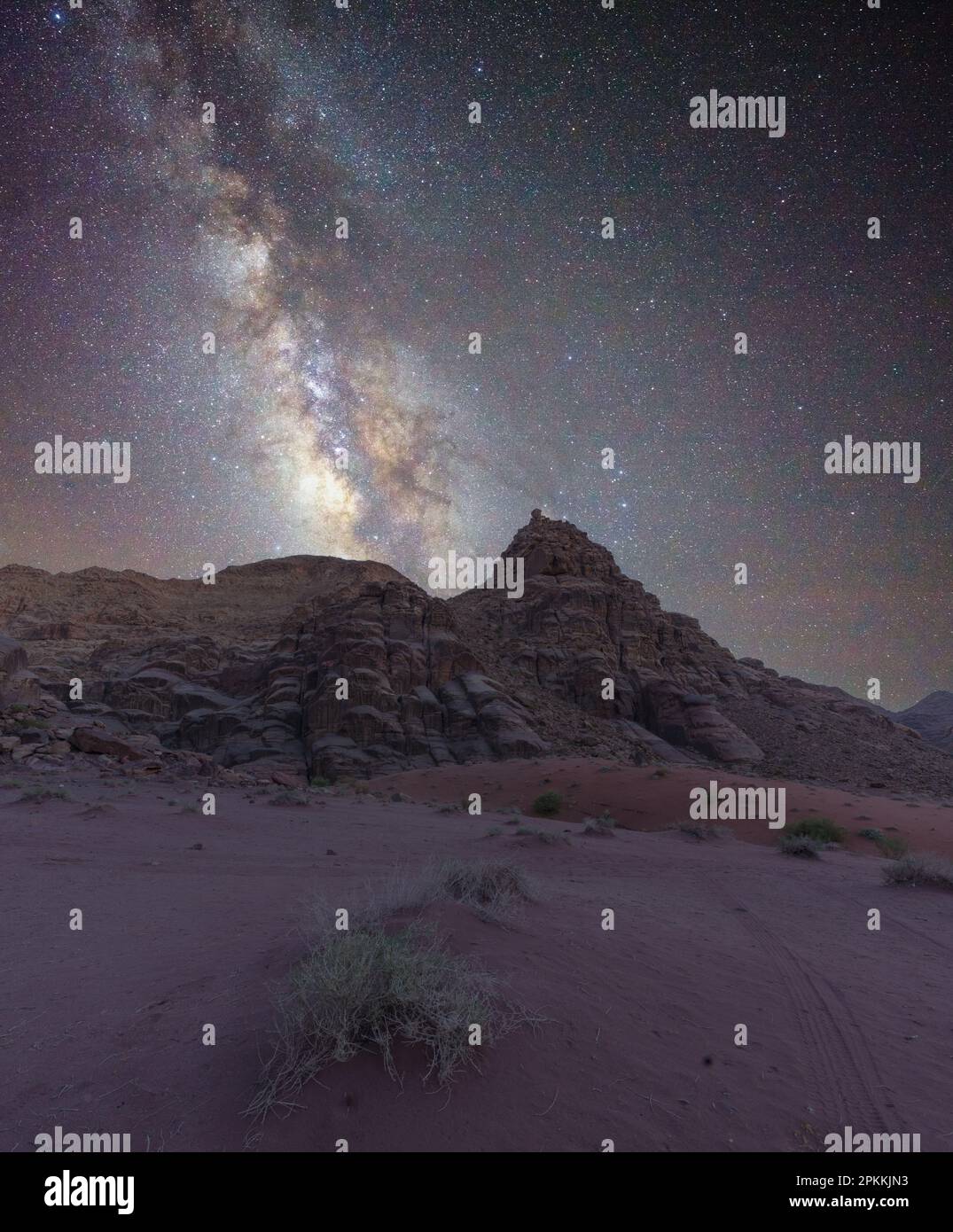 Milky Way core rising over a peak in the Wadi Rum desert, Jordan ...