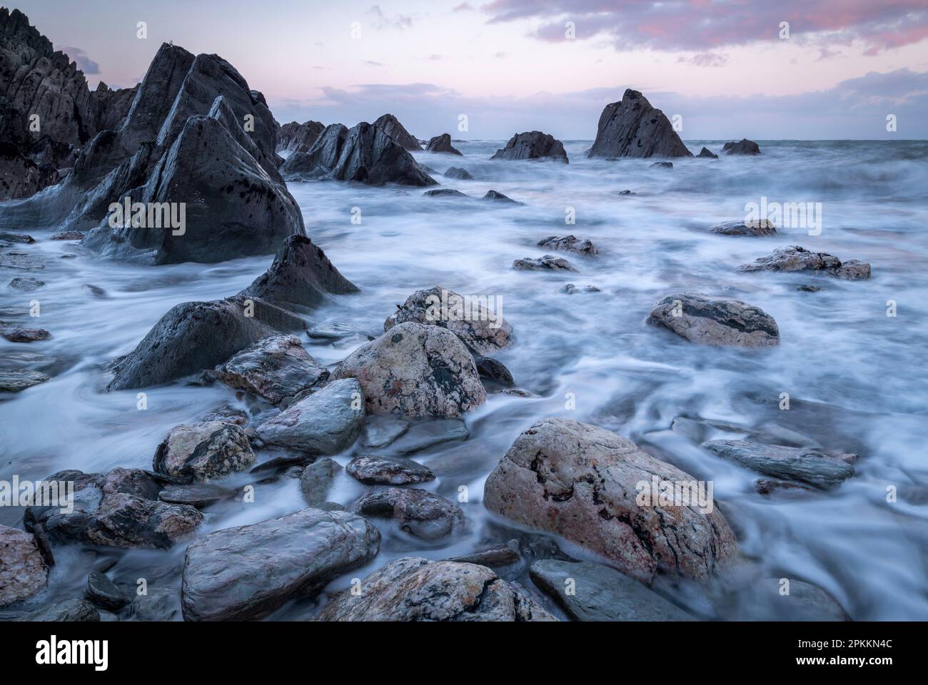 Dawn over the rugged coast of North Devon in winter, Devon, England ...