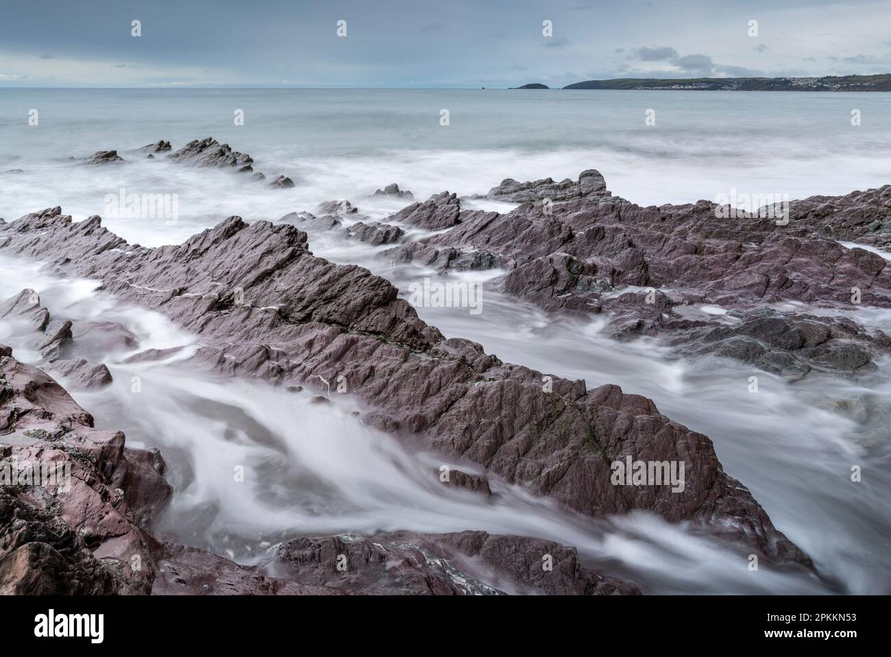 Stormy seas over rocky shores of Downderry Beach, in spring, Cornwall ...