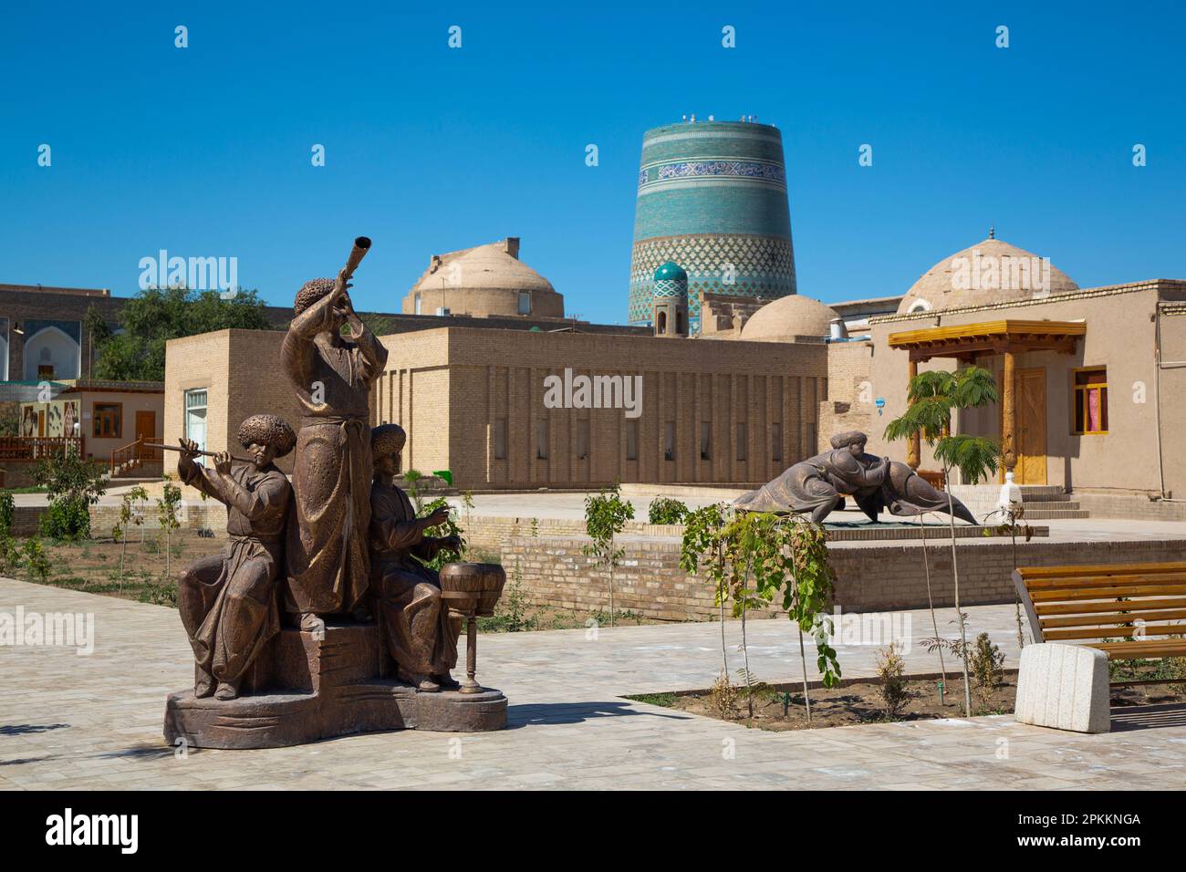 Sculpture with Kalta Minaret in the background, Ichon Qala (Itchan Kala ...