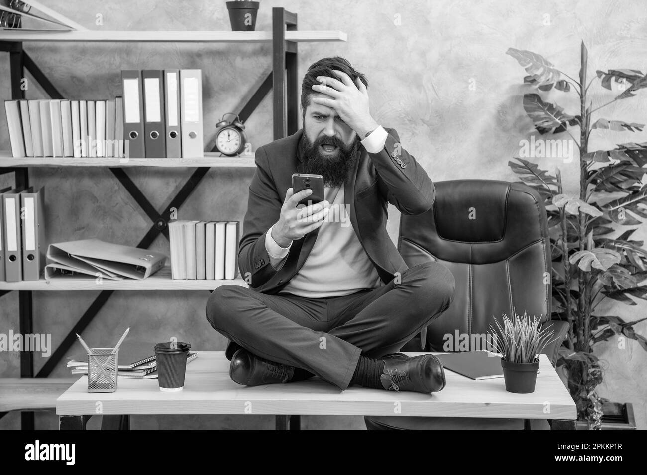 Oh no. Stressed businessman read sms. Panic attack from work stress ...