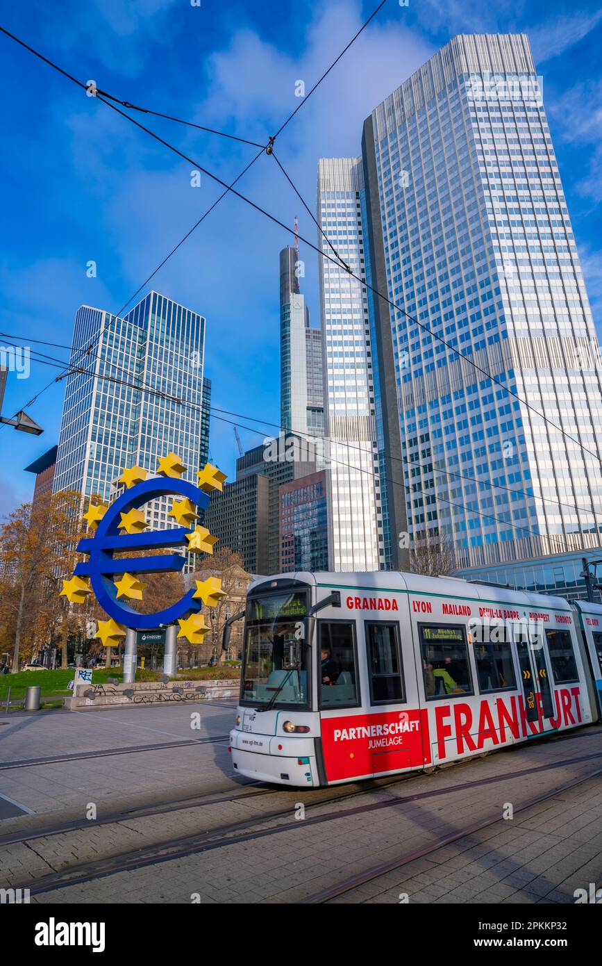 View of financial district skyline, city tram and the Euro Sculpture ...