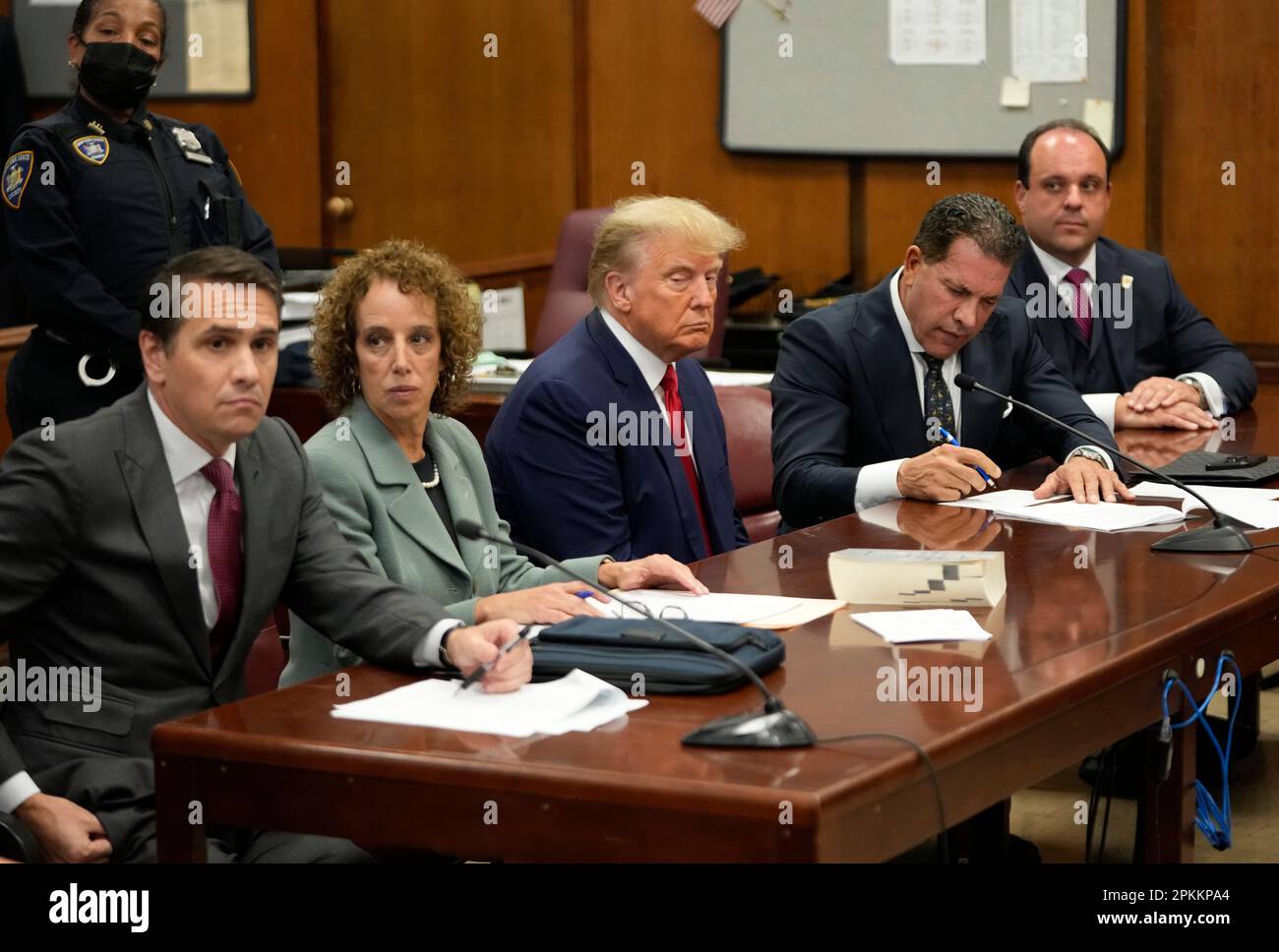 Former United States President Donald Trump, center, appears in the ...