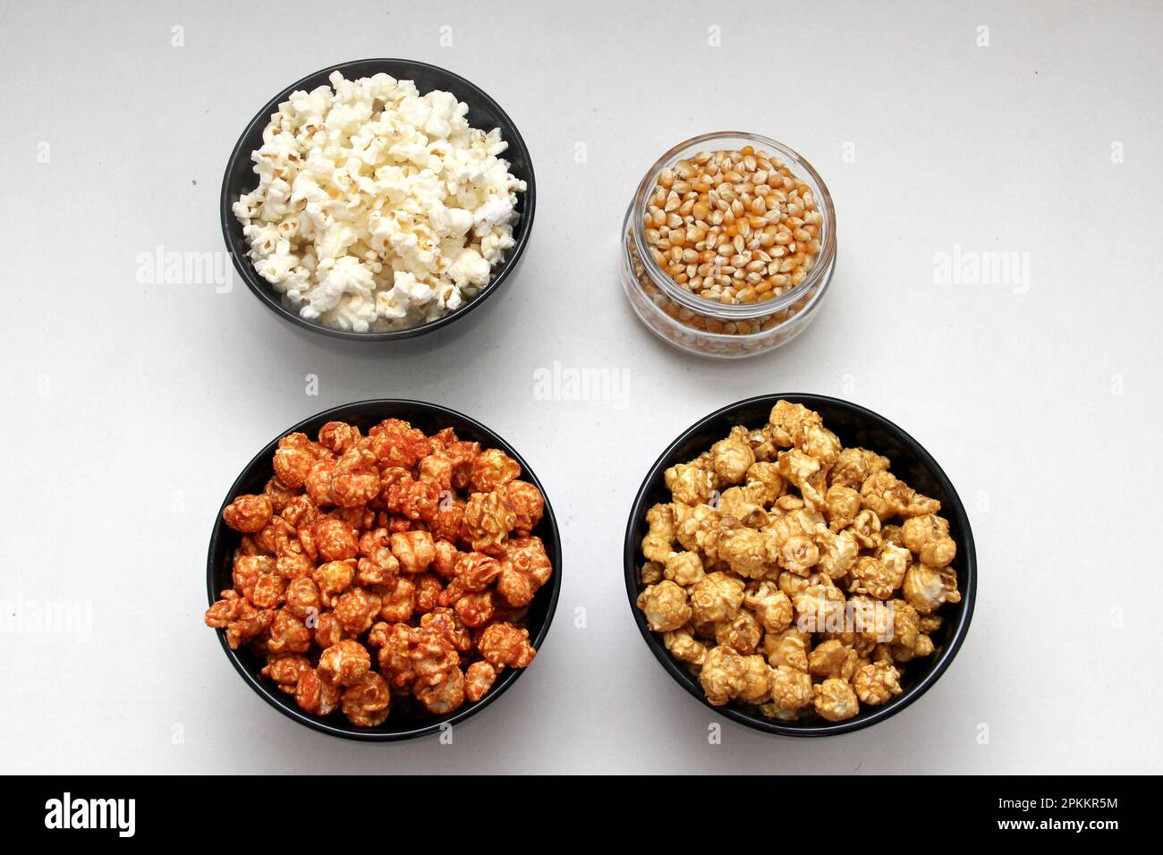 Flavored popcorn: natural, with chili and with caramel, Variety of ...