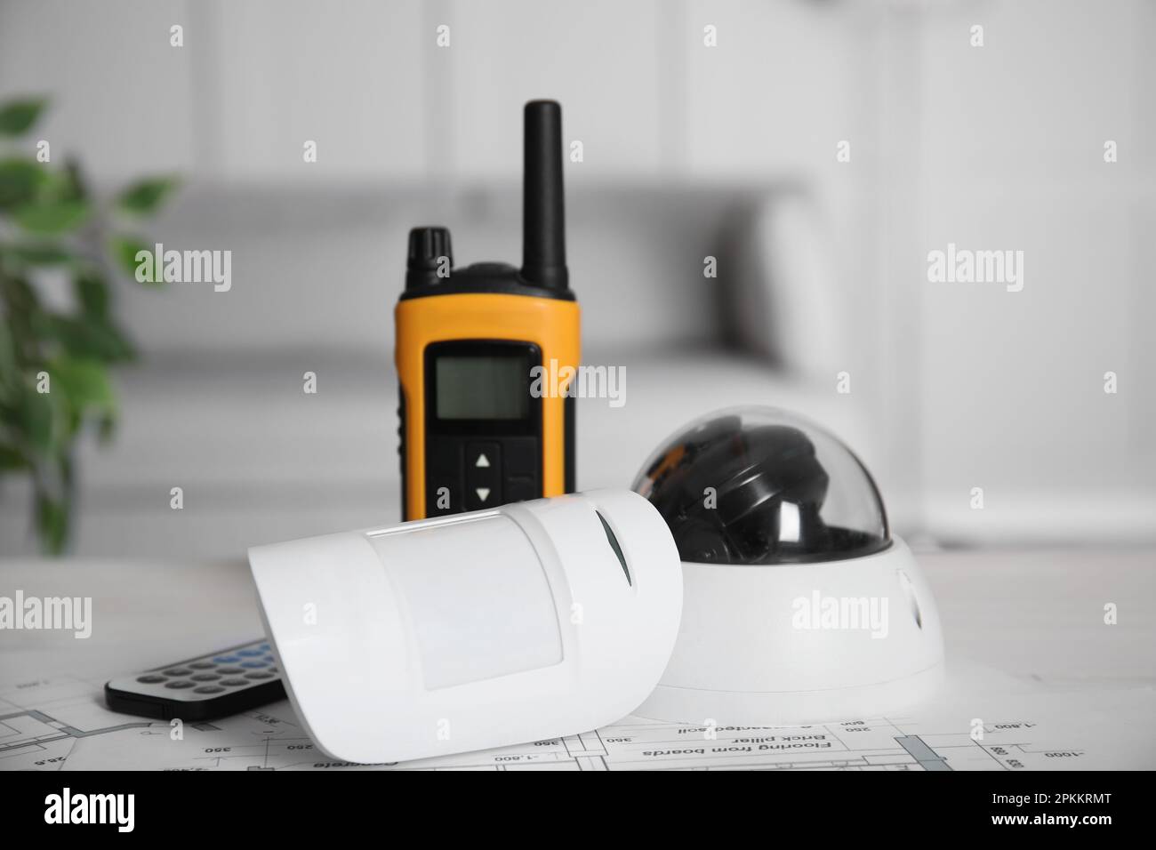 CCTV camera, remote control, movement detector and walkie talkie on ...