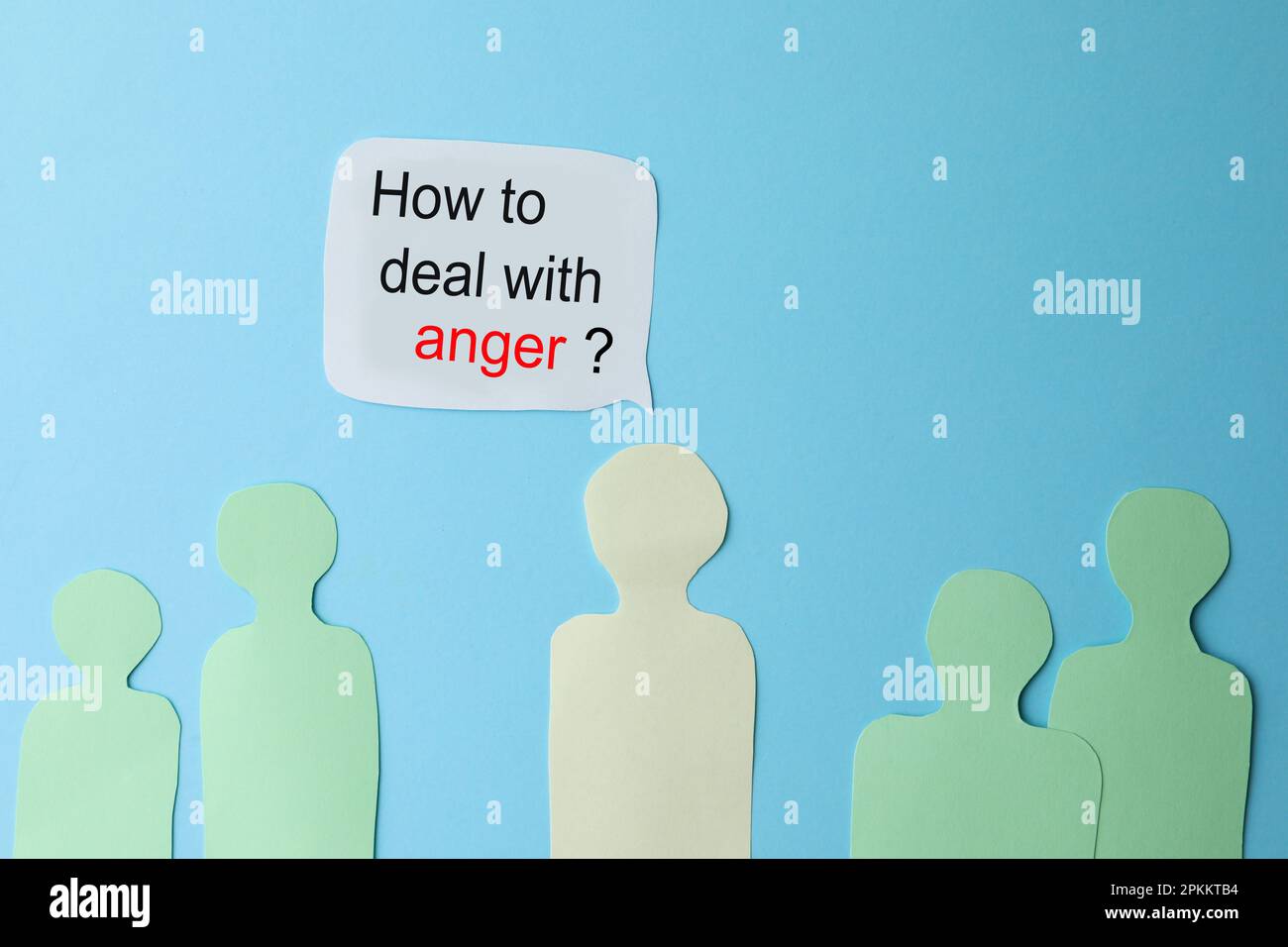 Paper cutout of crowd and speech bubble with inscription How To Deal ...