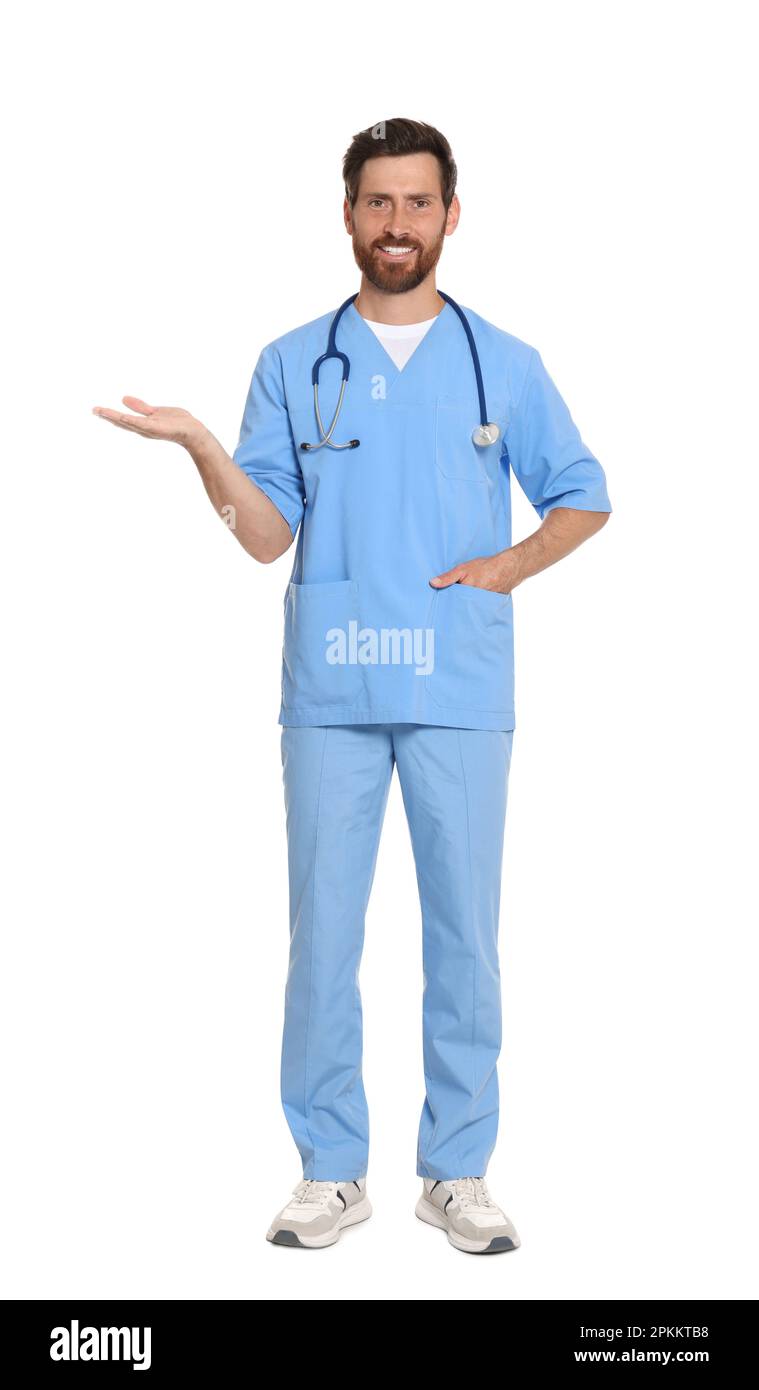 Full length portrait of doctor in scrubs on white background Stock ...
