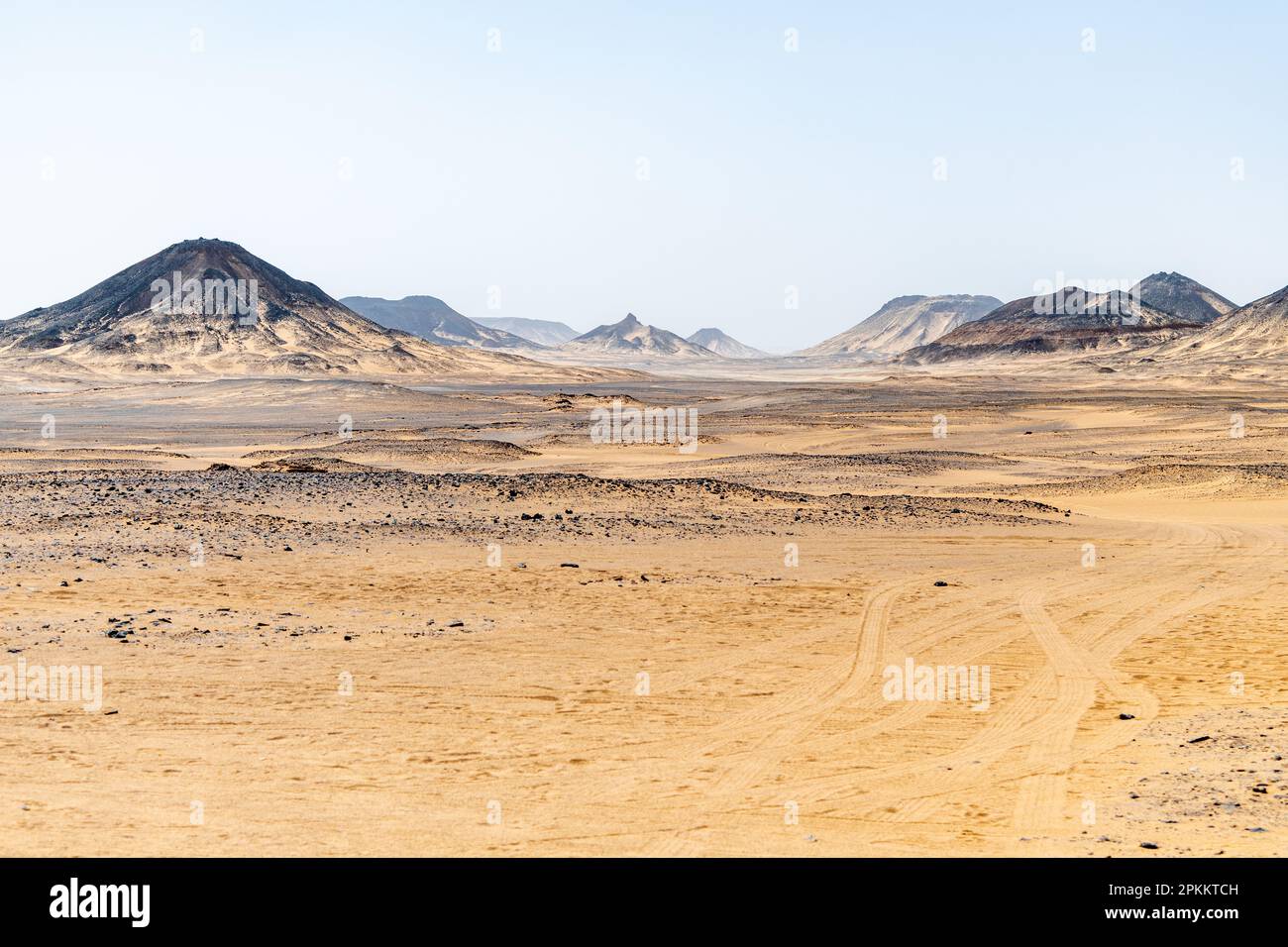 A view of the rocky outcrops / basalt mounds in the Black Desert in ...