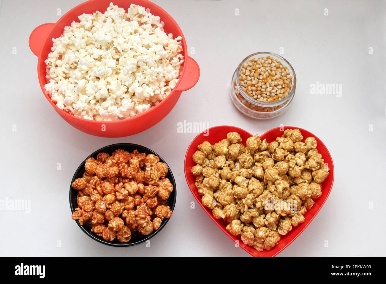 Flavored popcorn: natural, with chili and with caramel, Variety of ...