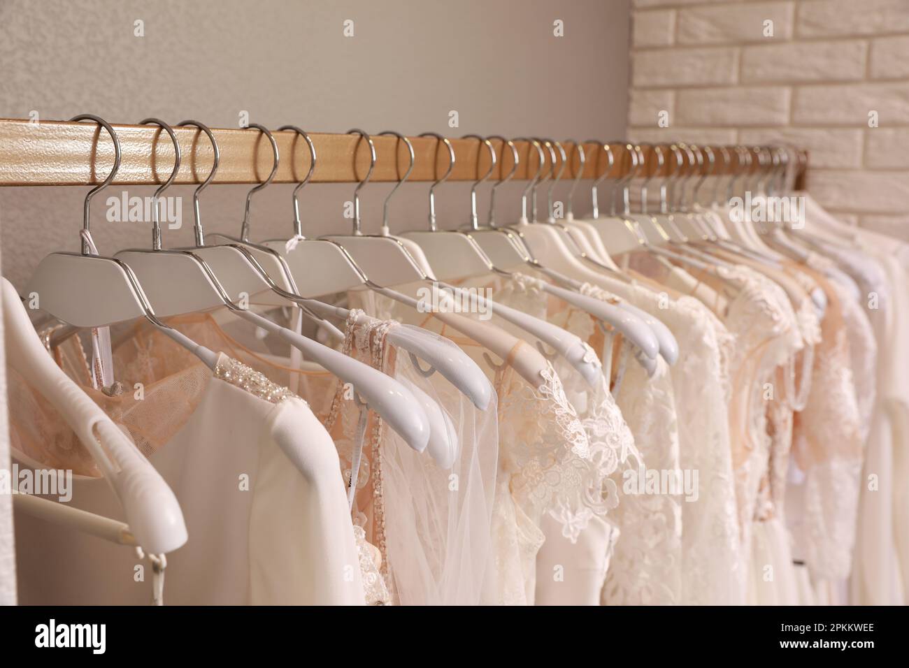 Dresses on hangers hi-res stock photography and images - Alamy