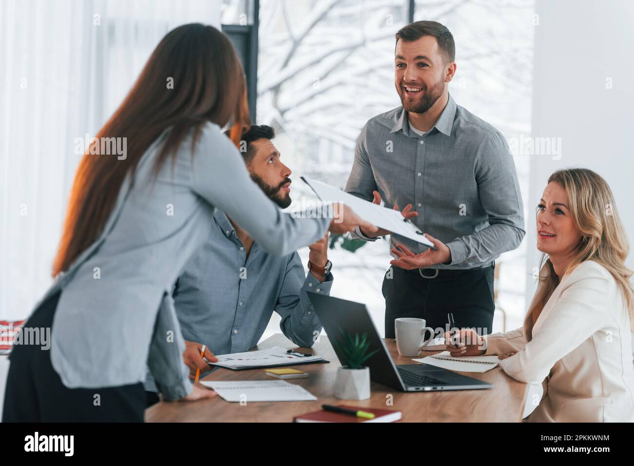 Active conversation. Group of business people that working on the ...