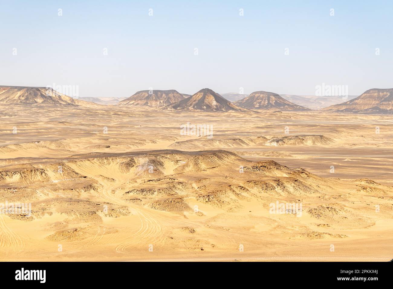 A view of the rocky outcrops / basalt mounds in the Black Desert in ...