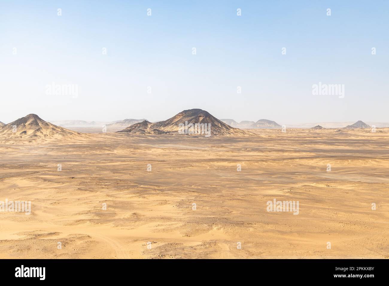 A view of the rocky outcrops / basalt mounds in the Black Desert in ...