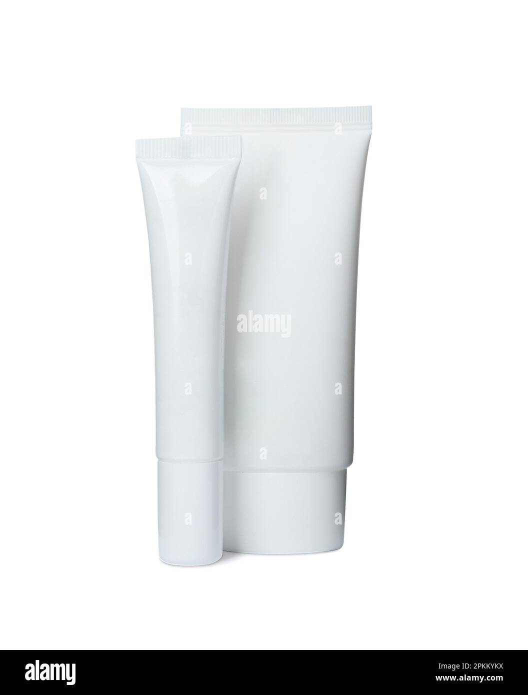 Tubes of different hand creams on white background. Mockup for design ...