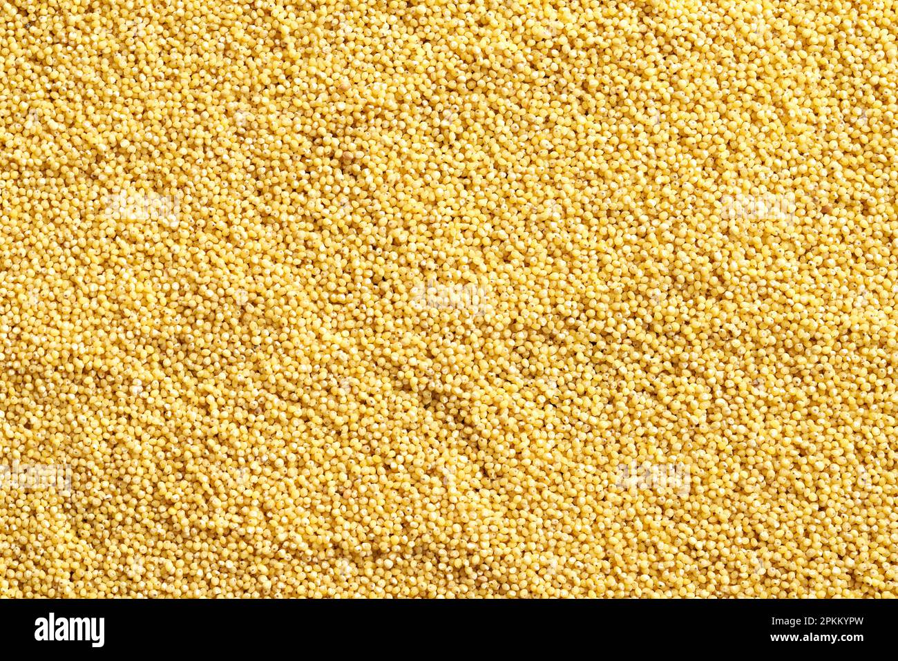Peeled millet as textured background with copy space Stock Photo - Alamy