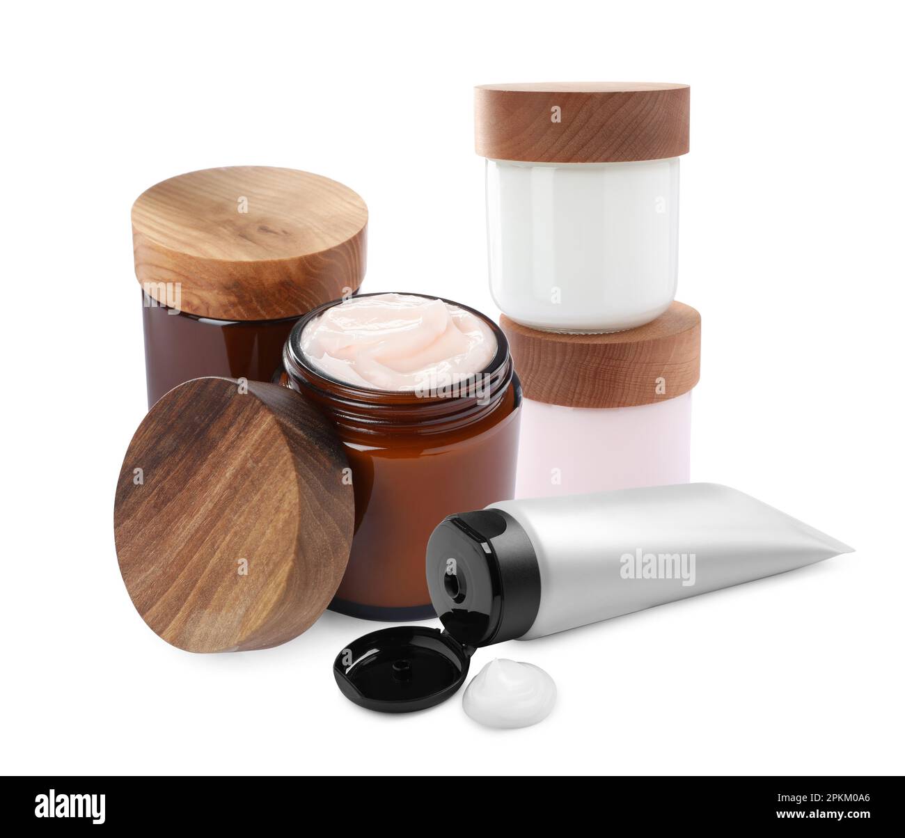 Set with tube and jars of facial cream on white background Stock Photo ...