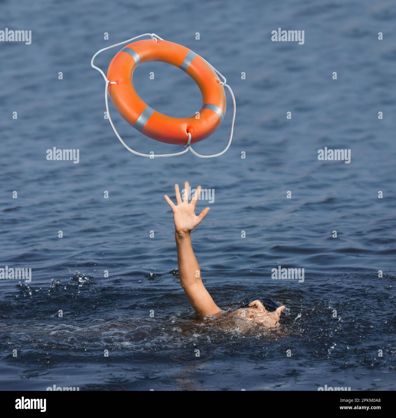 Woman swimming life belt hi-res stock photography and images - Alamy
