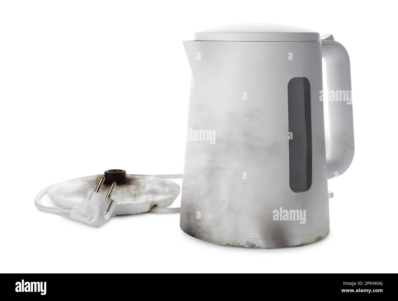 Burnt electric kettle with base and plug on white background Stock ...
