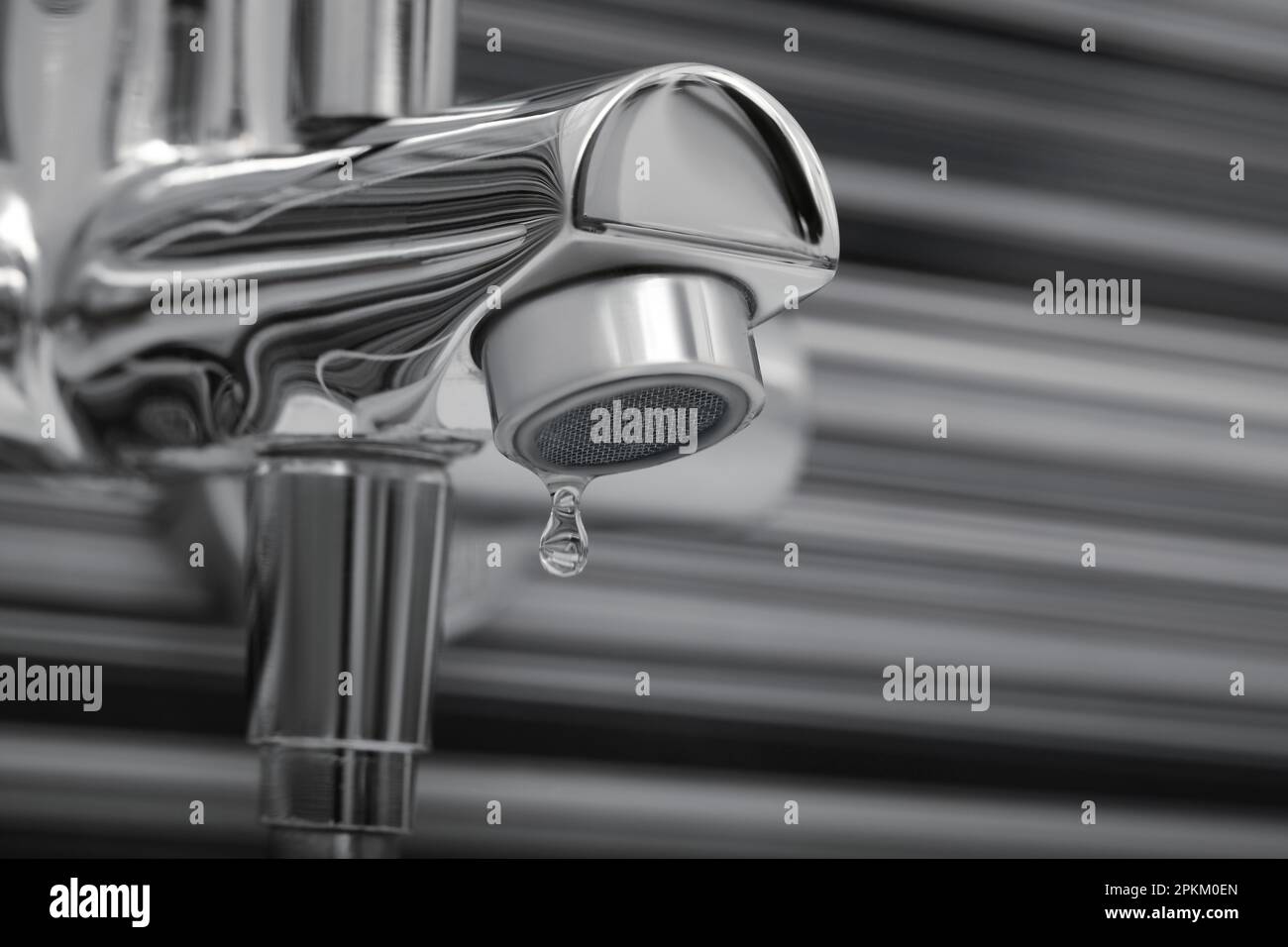 Water drops falling down from tap in bathroom, closeup Stock Photo - Alamy