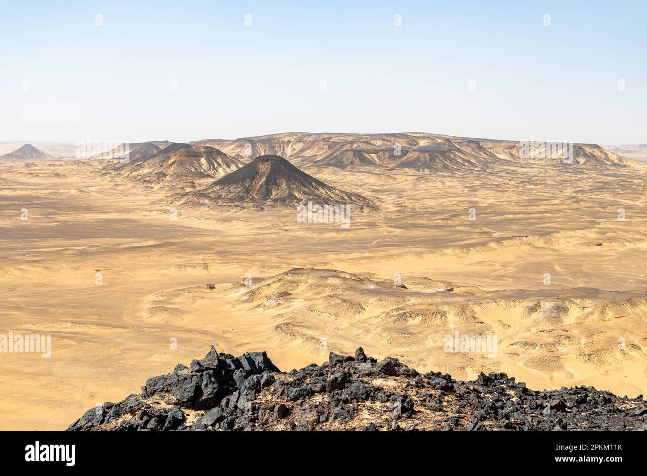 A view of the rocky outcrops / basalt mounds in the Black Desert in ...