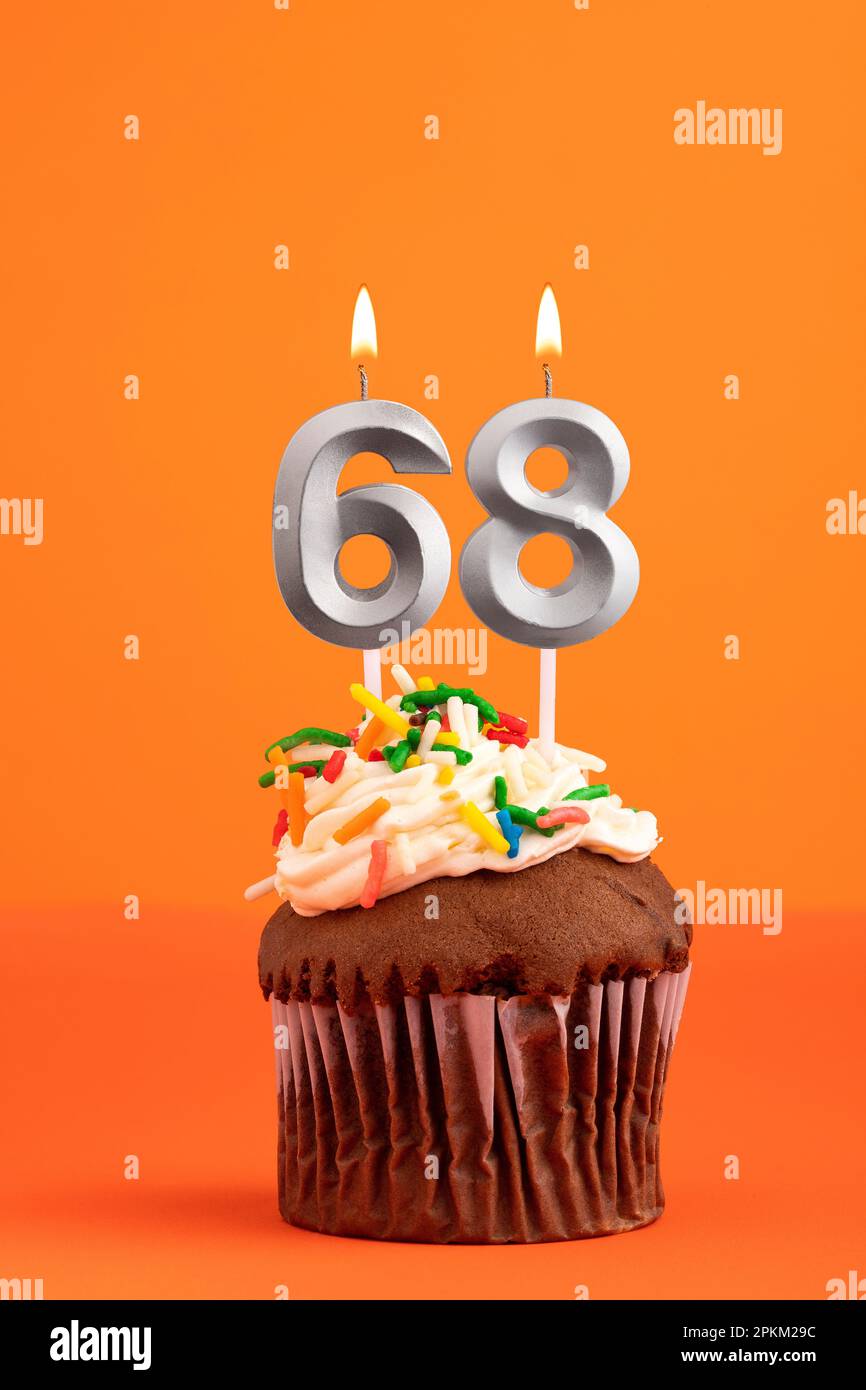 Birthday cake with candle number 68 - Orange foamy background Stock ...