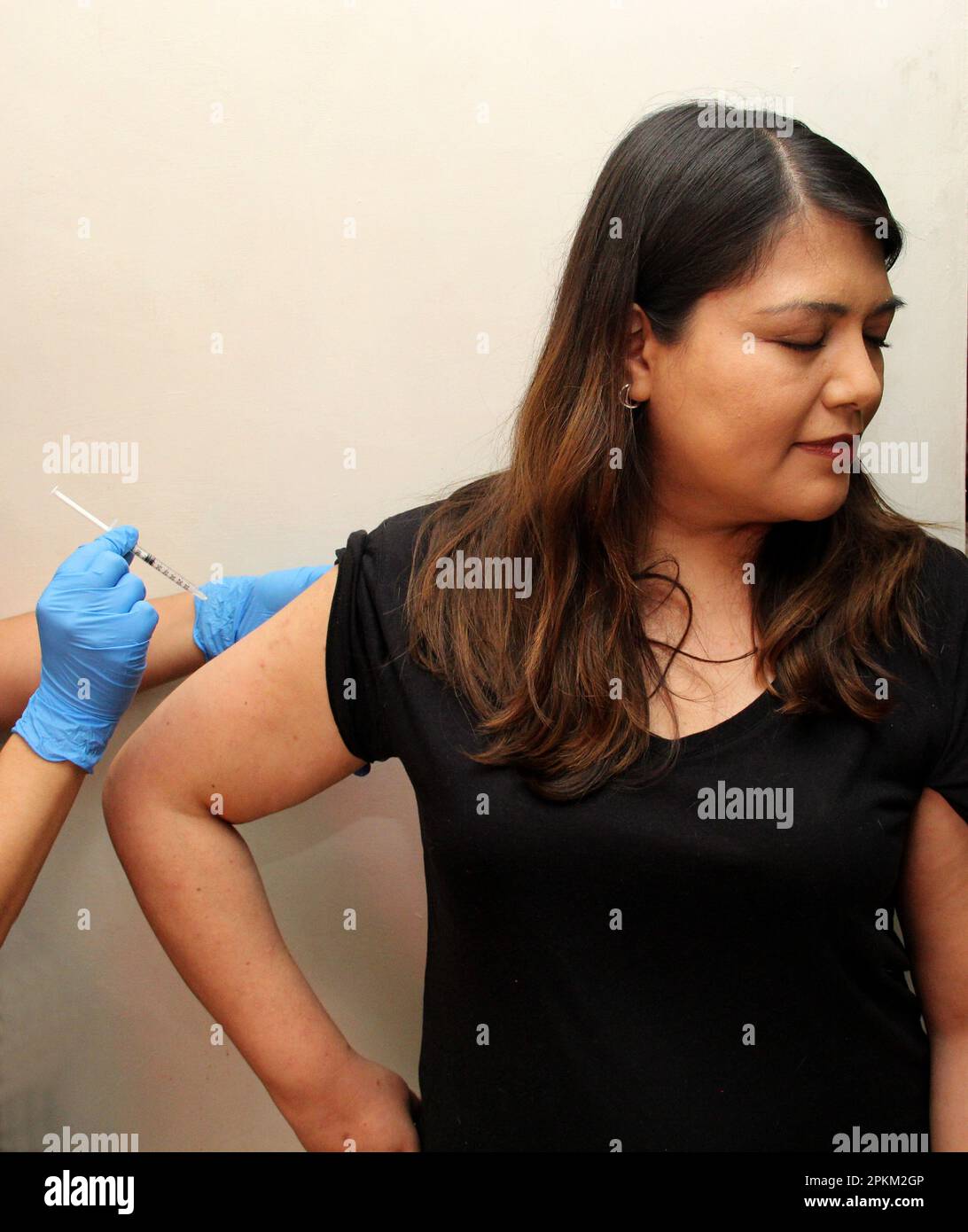 40-year-old Latin mature woman happy after receiving covid-19 vaccine ...