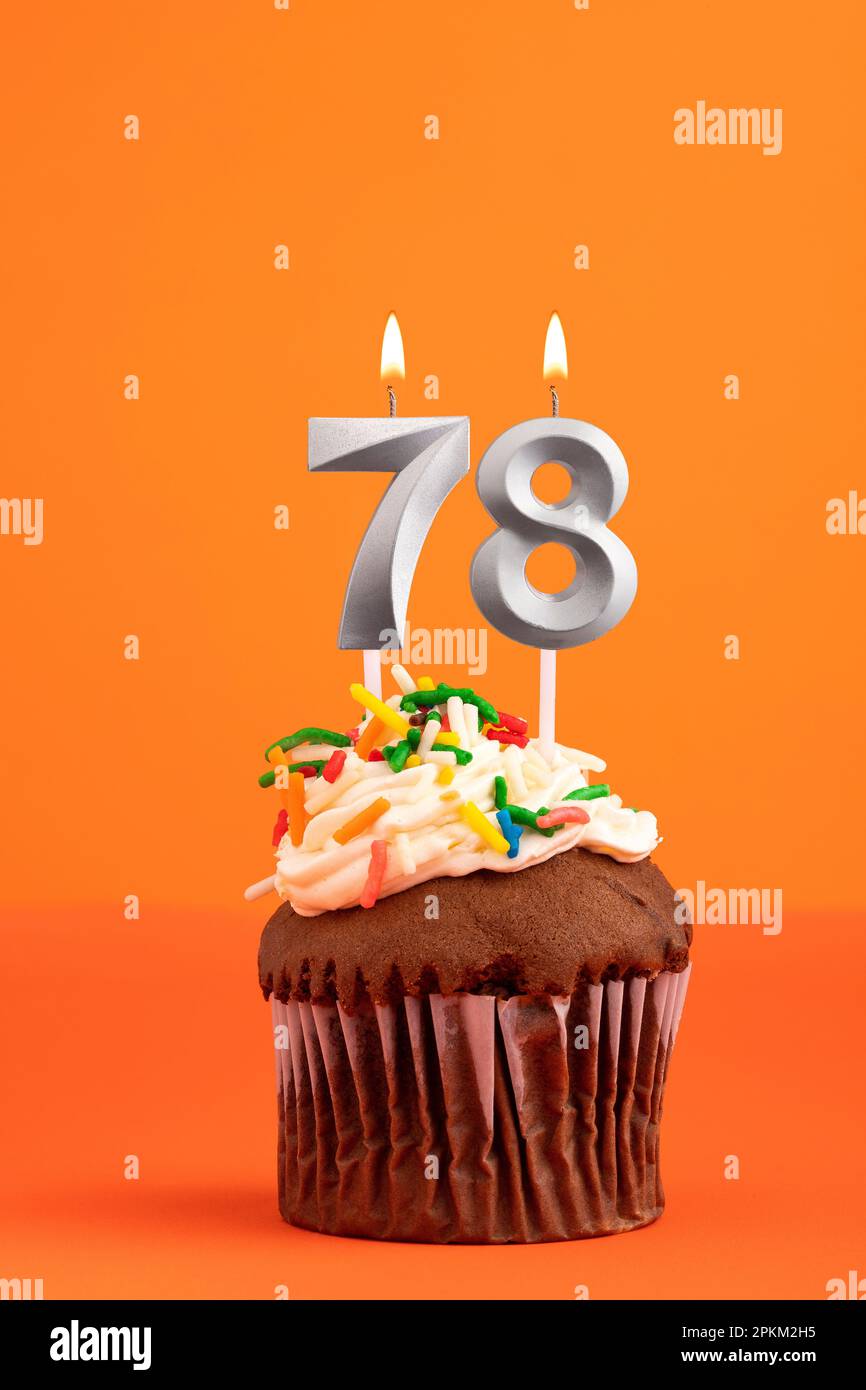 Birthday cake with candle number 78 - Orange foamy background Stock ...