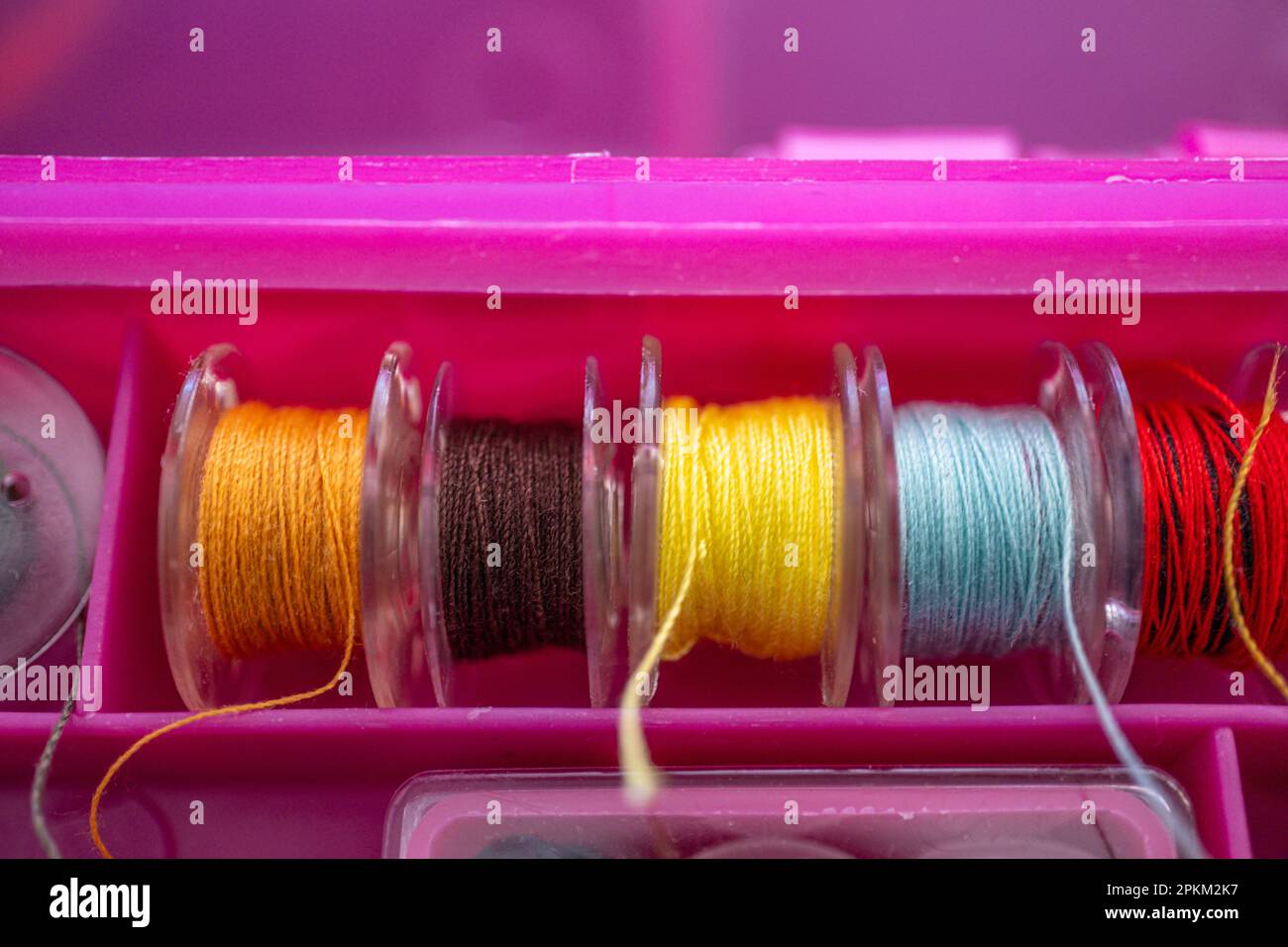 Closeup of threads and other items used for sewing Stock Photo - Alamy
