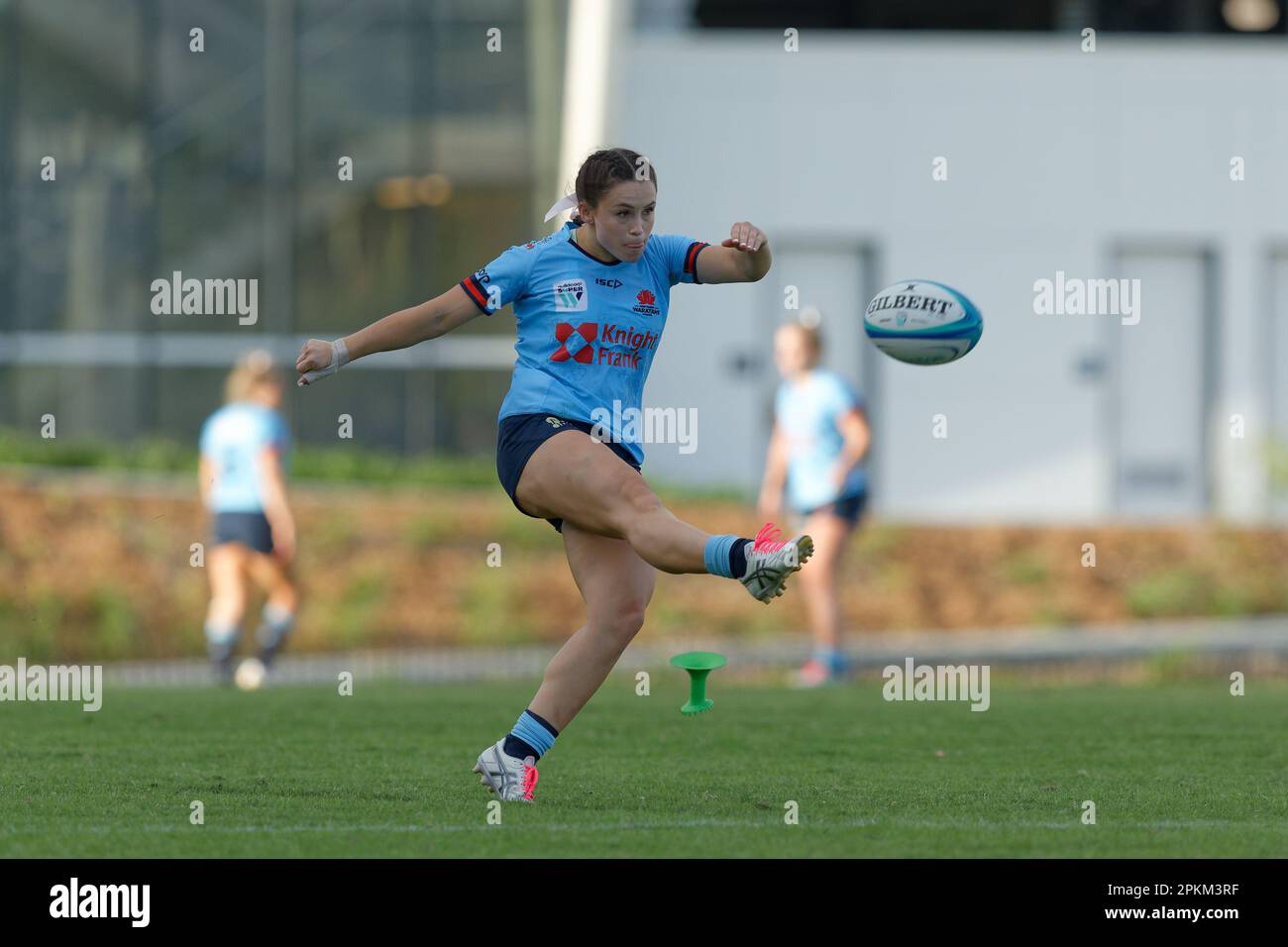 Desiree Miller of the Waratahs kicks a conversion during the Buildcorp ...
