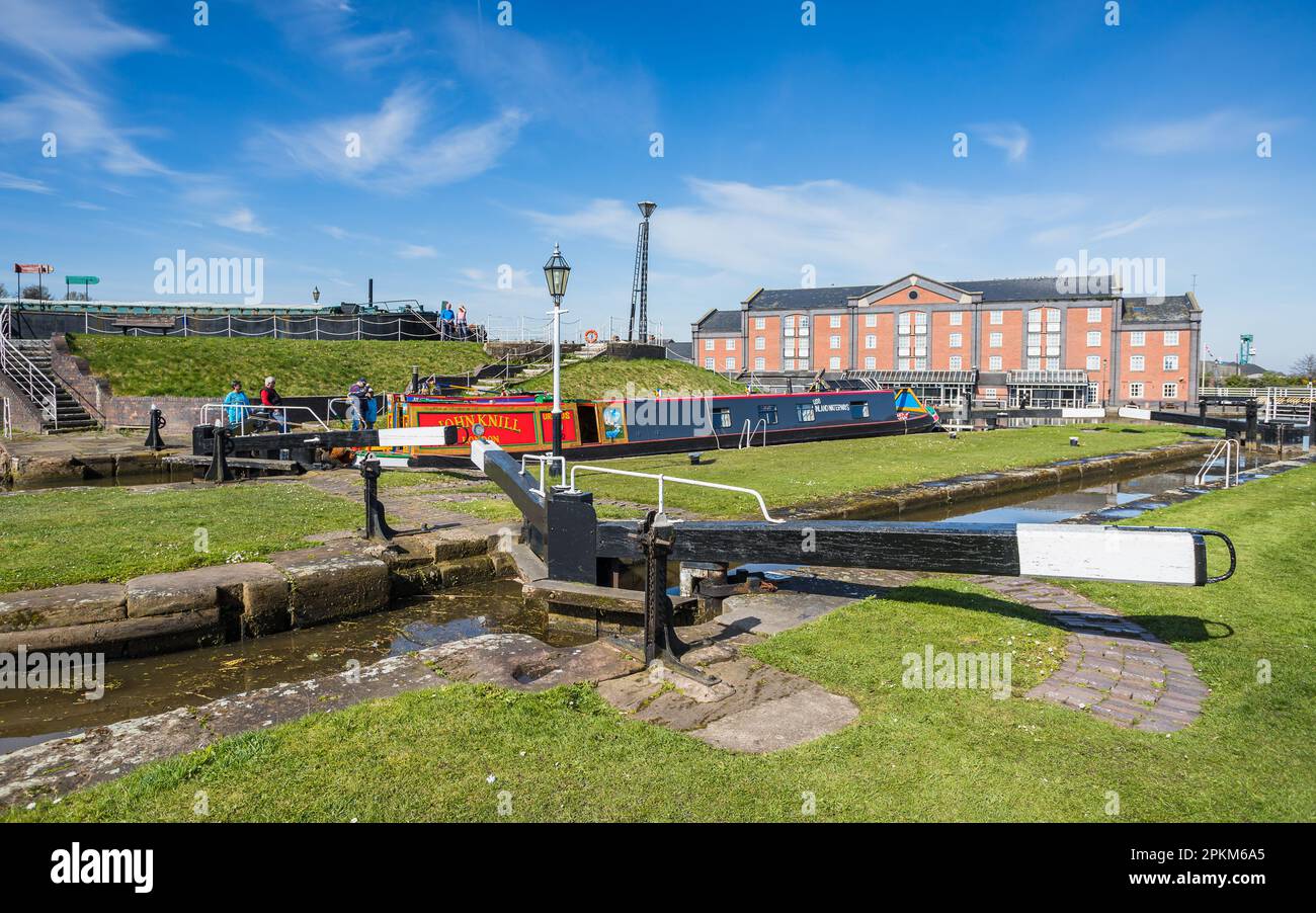 Narrow boats in a lock on the Ellesmere Canal at Ellesmre Port pictured ...