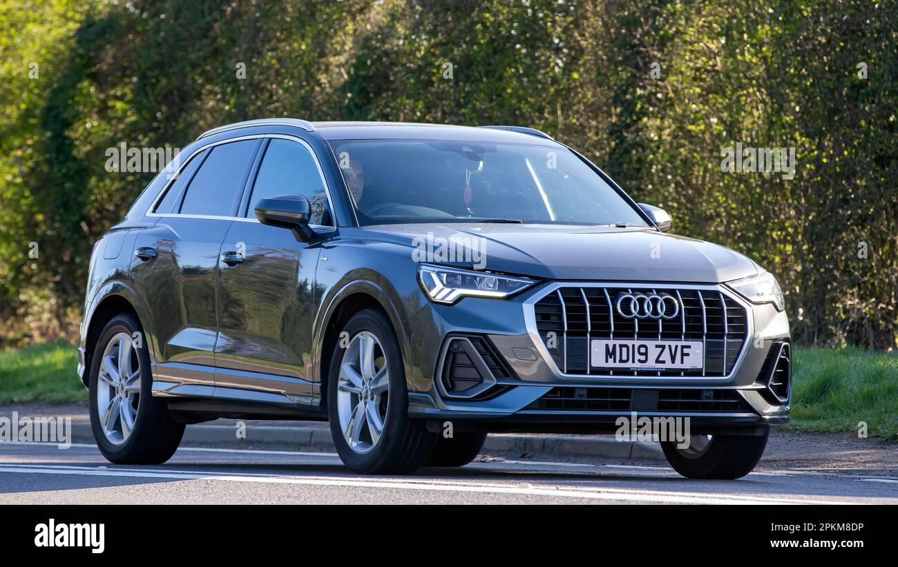 2019 grey AUDI Q3 car travelling on an English country road Stock Photo ...