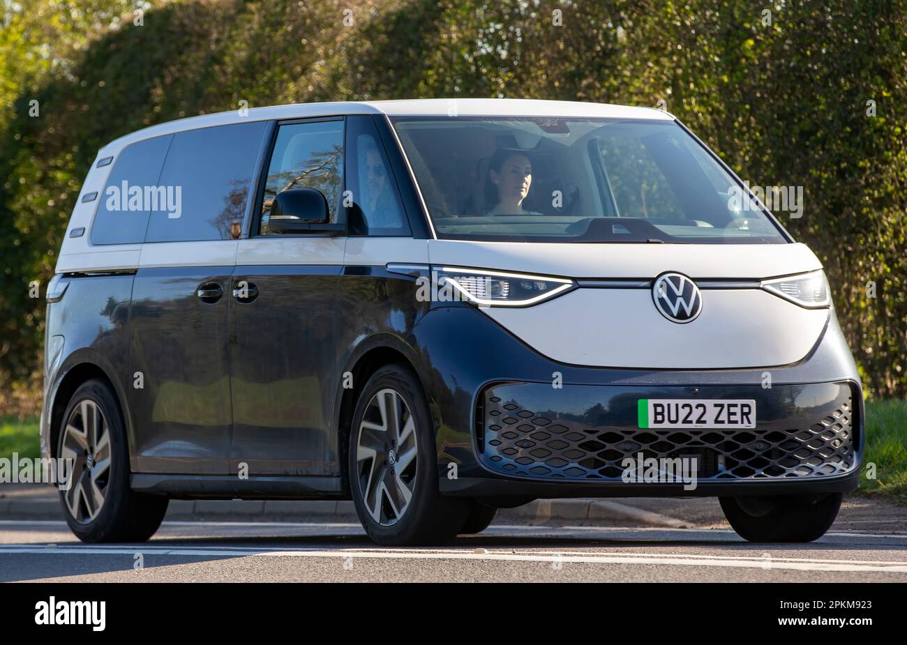 2023 electric VOLKSWAGEN ID BUZZ STYLE camper van travelling on an English country road Stock ...