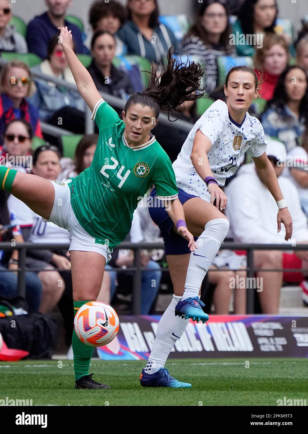Ireland forward Marissa Sheva (24) moves the ball past United States ...