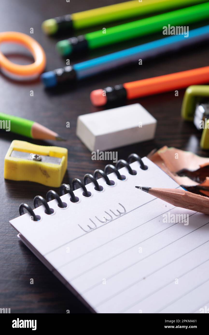 www write on notepad with pencil Stock Photo - Alamy