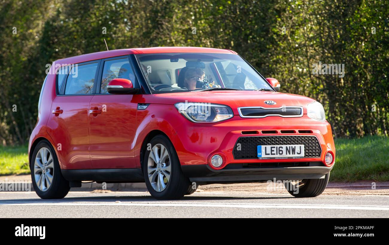 2016 red Kia Soul car travelling on an English country road Stock Photo ...