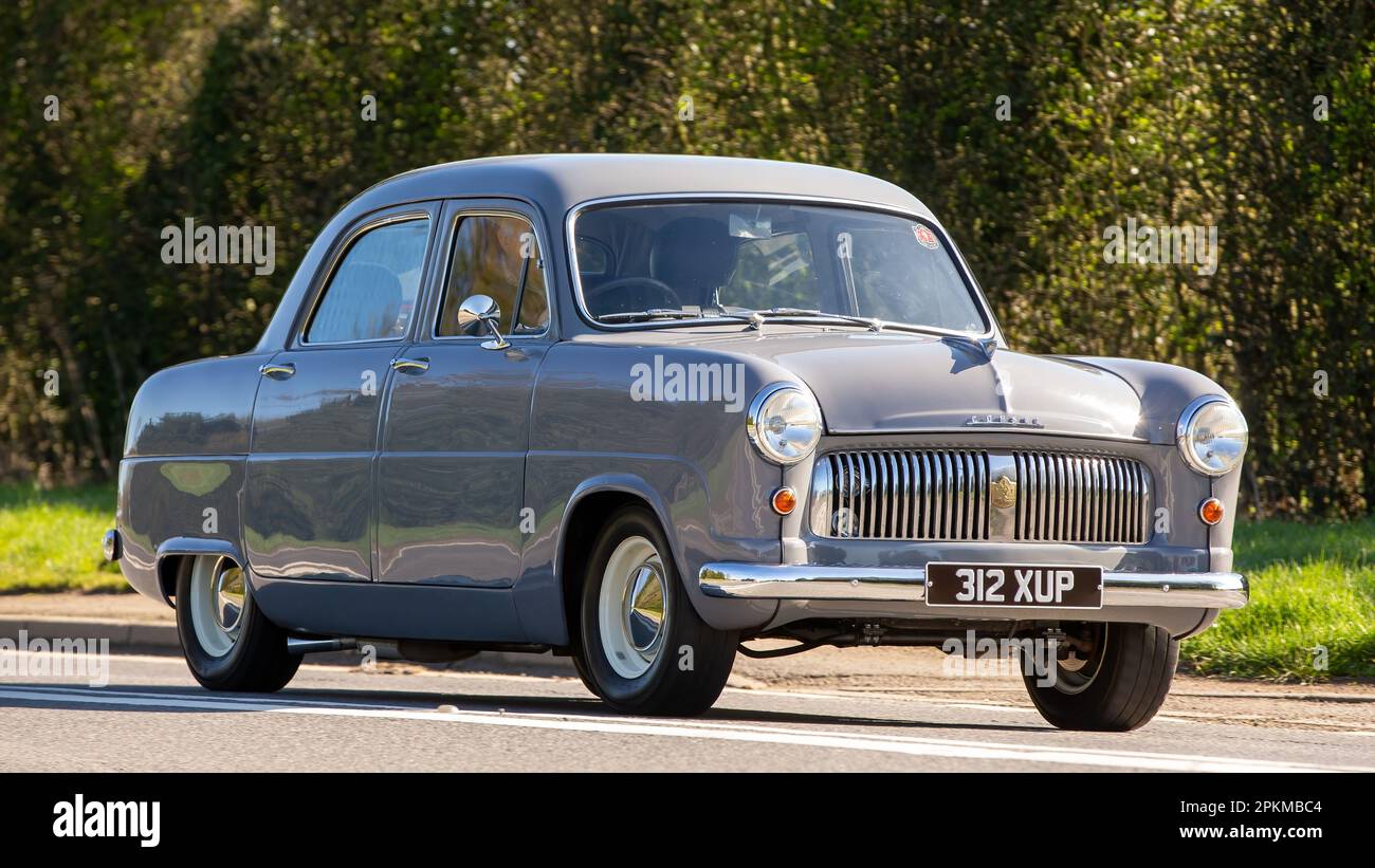1953 grey Ford Consul classic car travelling on an English country road ...