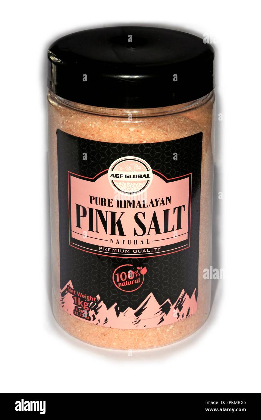 Large clear tub of Pure Himalayan Pink Rock salt Stock Photo - Alamy