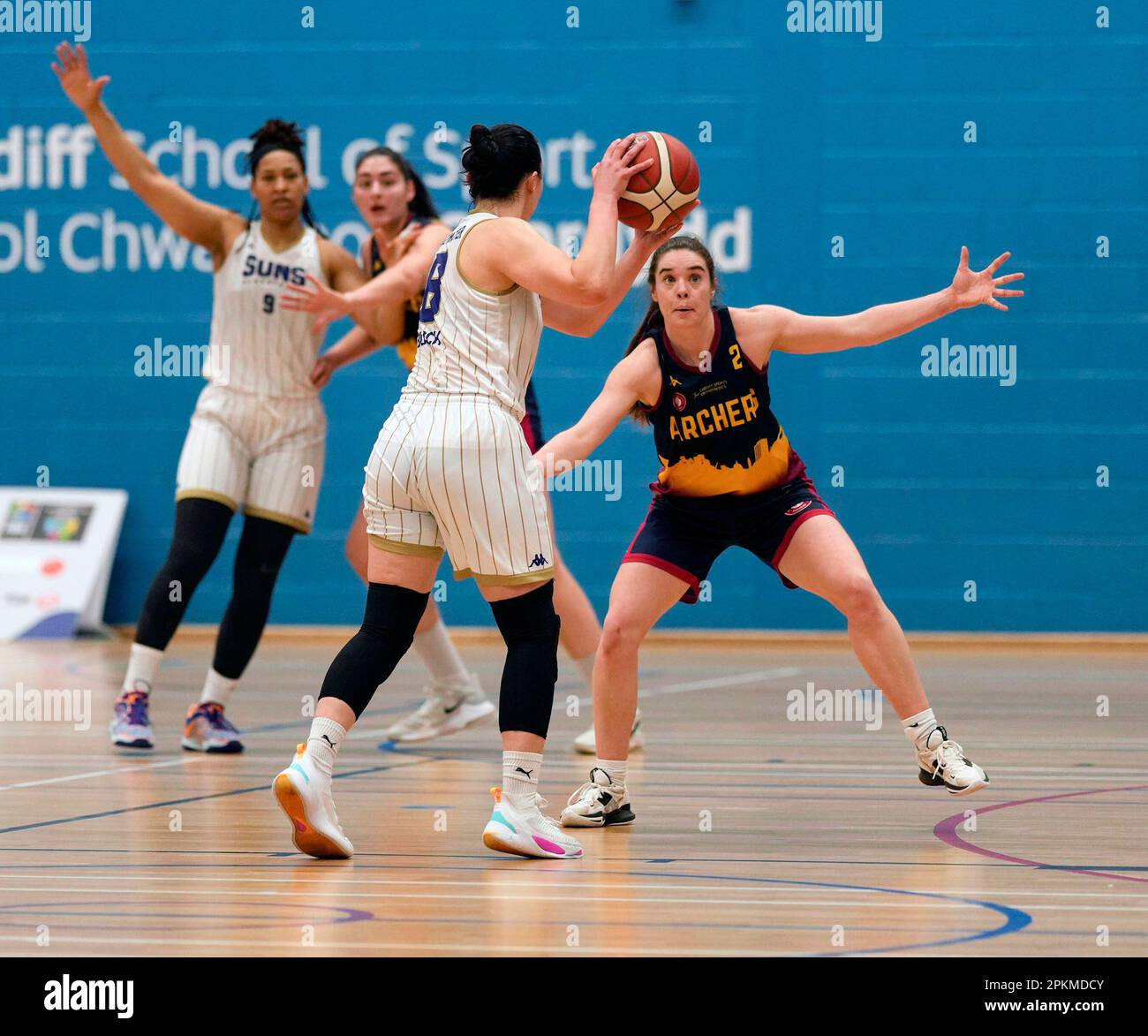 Cardiff, UK. 08th Apr, 2023. Renee Busch (Suns) (C) is blocked by ...